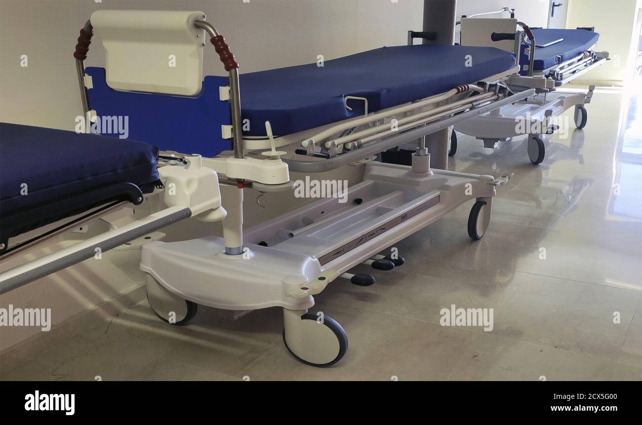 Closeup of Stretchers in the hallway of a hospital Stock Photo - Alamy