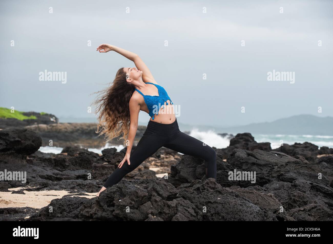 Yoga at the beach Stock Photo - Alamy