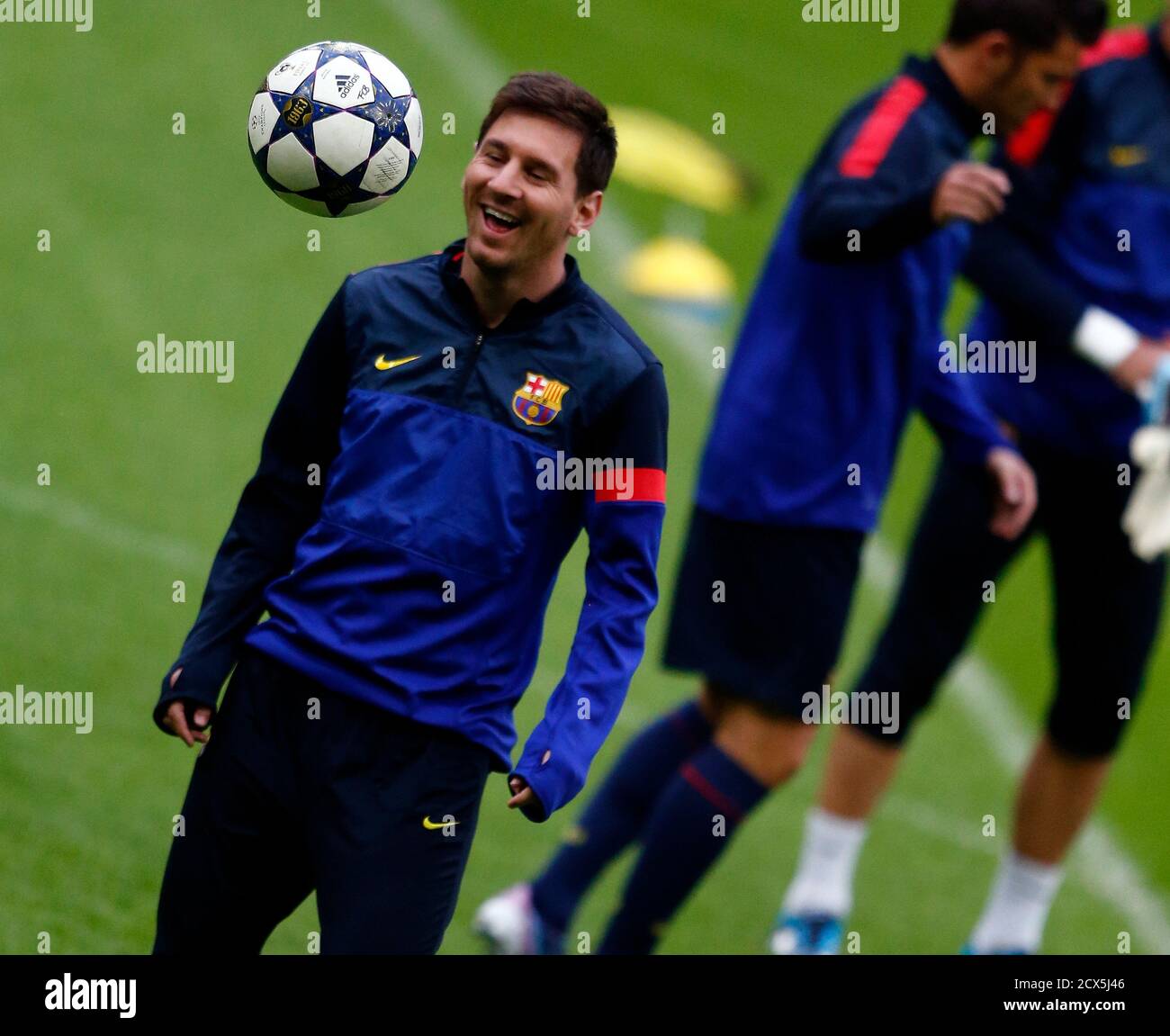 Barcelonas lionel messi attends training hi-res stock photography and ...