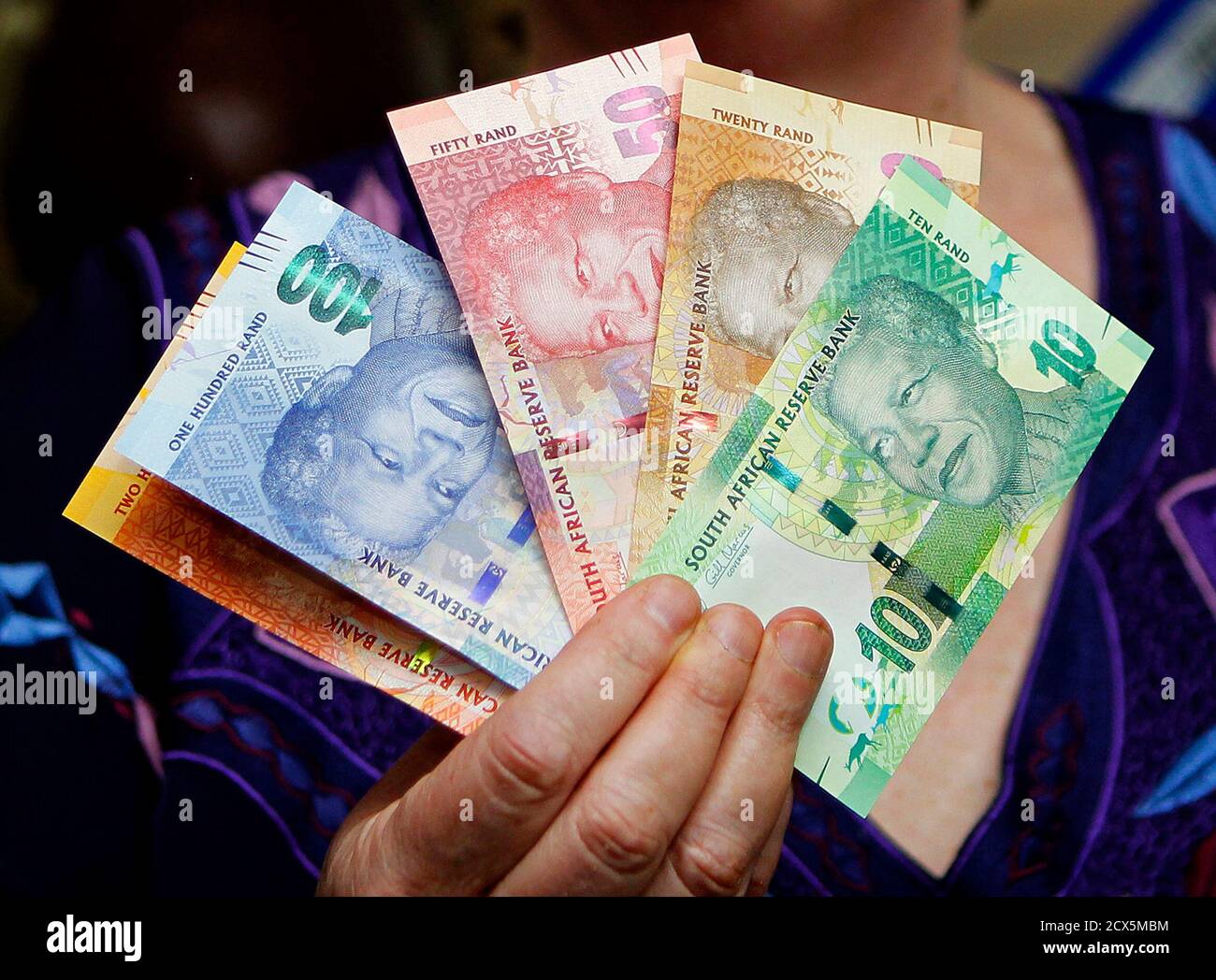 South african banknotes in hand hi-res stock photography and images - Alamy
