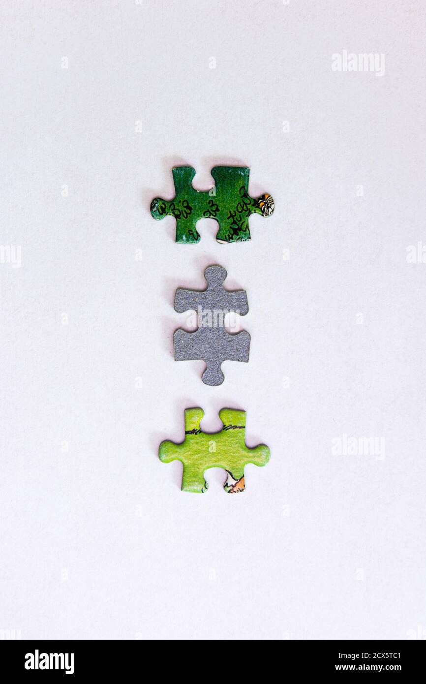 Three puzzle pieces fit together hi-res stock photography and images ...
