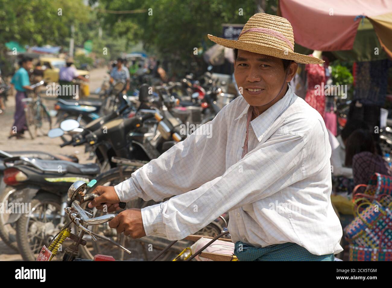 Burmese man with bicycle. Mandalay, Burma. Myanmar Stock Photo - Alamy