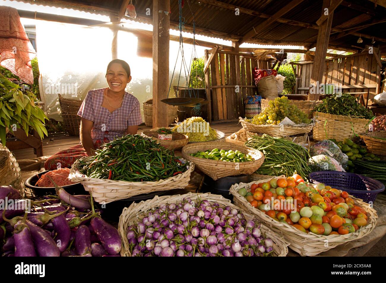 Laughing Burmese fruit and vegetable vendor at Kalaw market, Burma ...