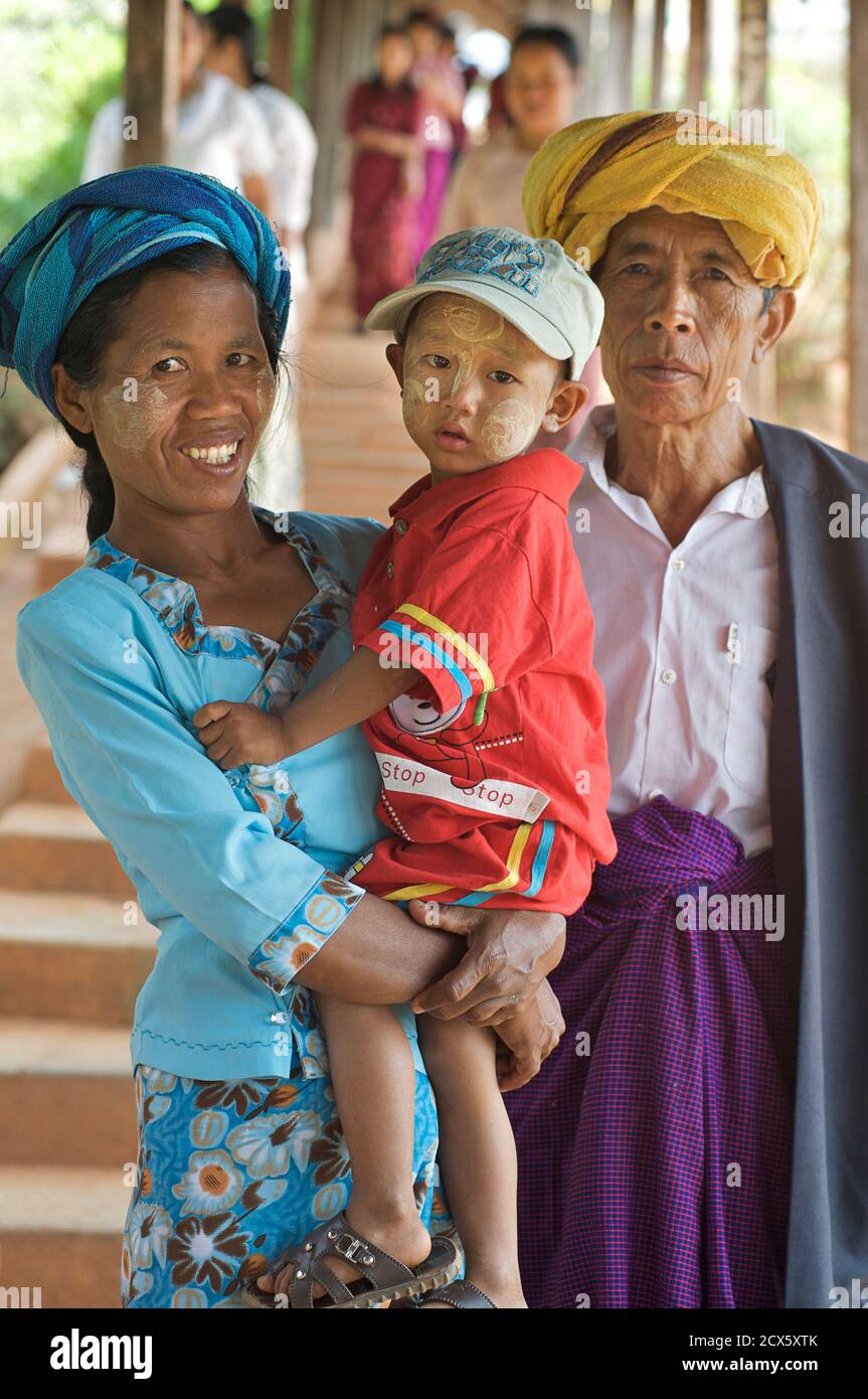 Mother and granfather. Child with tanaka painted face. Kalaw, Burma ...