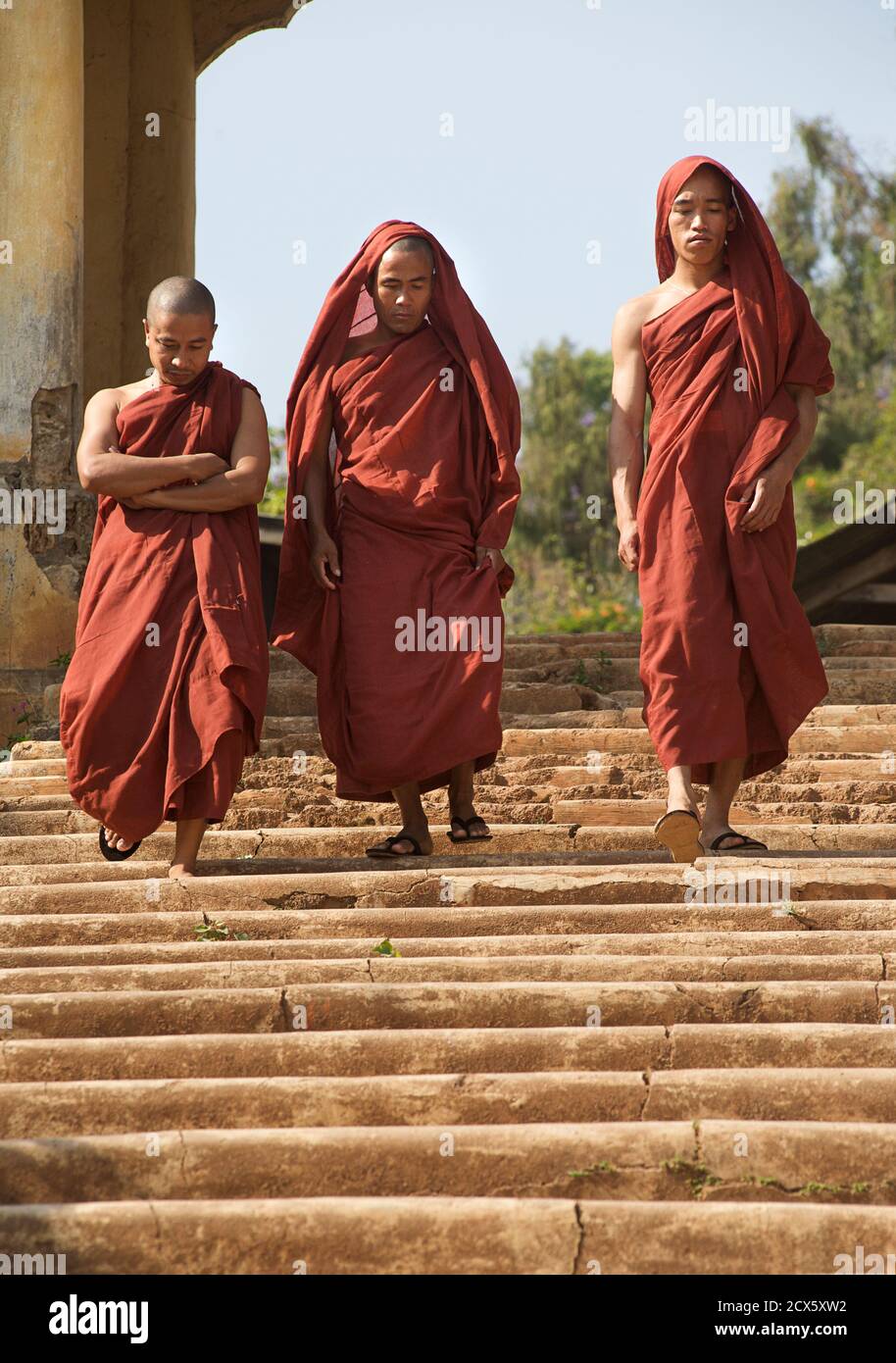 Buddhist monks walking down steps from monastery. Kalaw, Burma. Myanmar ...