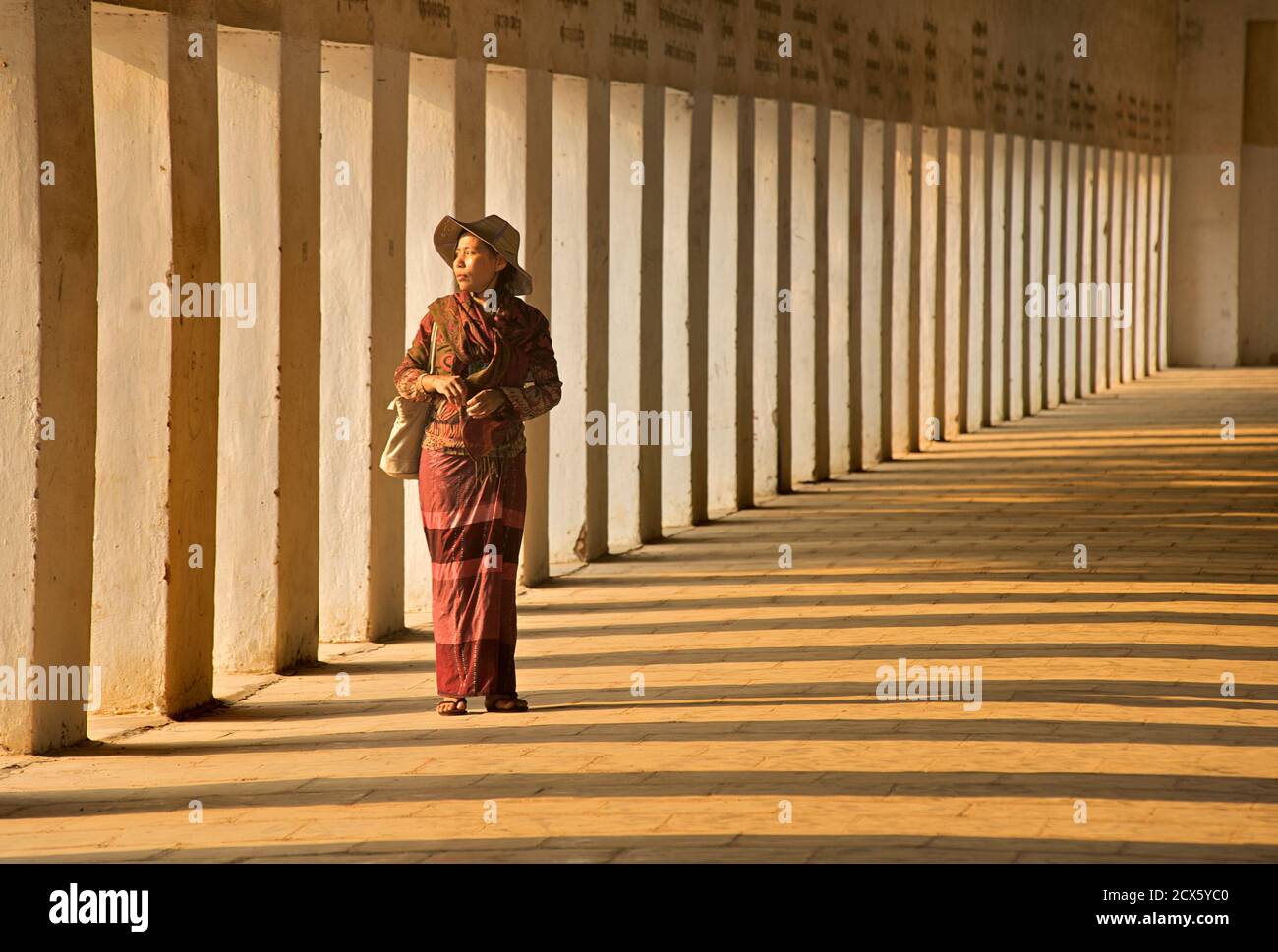 Burmese woman in the corridor at Shwezigon Pagoda, Bagan. Burma. Model ...