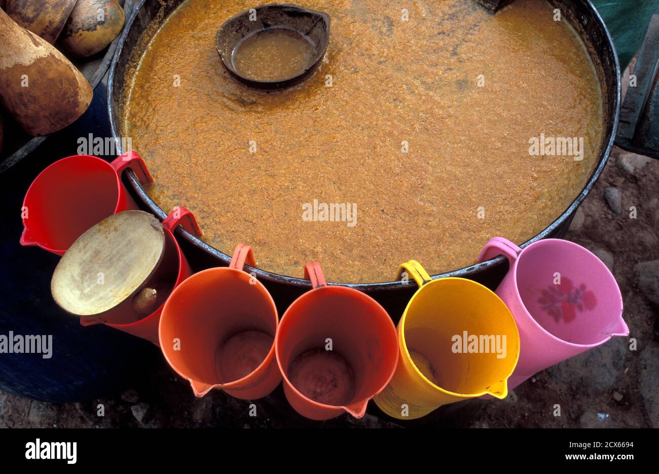 Alcoholic brew, chicha, being sold at the August Fiesta of San ...