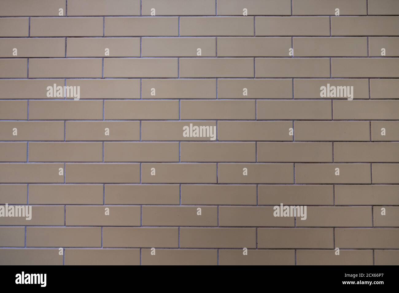 Background wall of modern grey bricks fastened with cement, horizontal ...