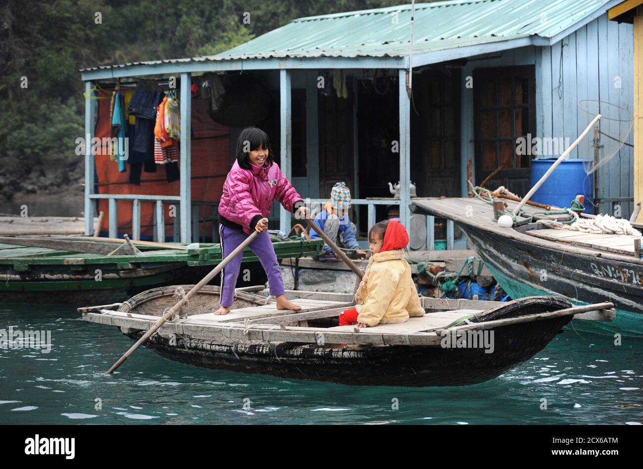 Children row boat in hi-res stock photography and images - Alamy