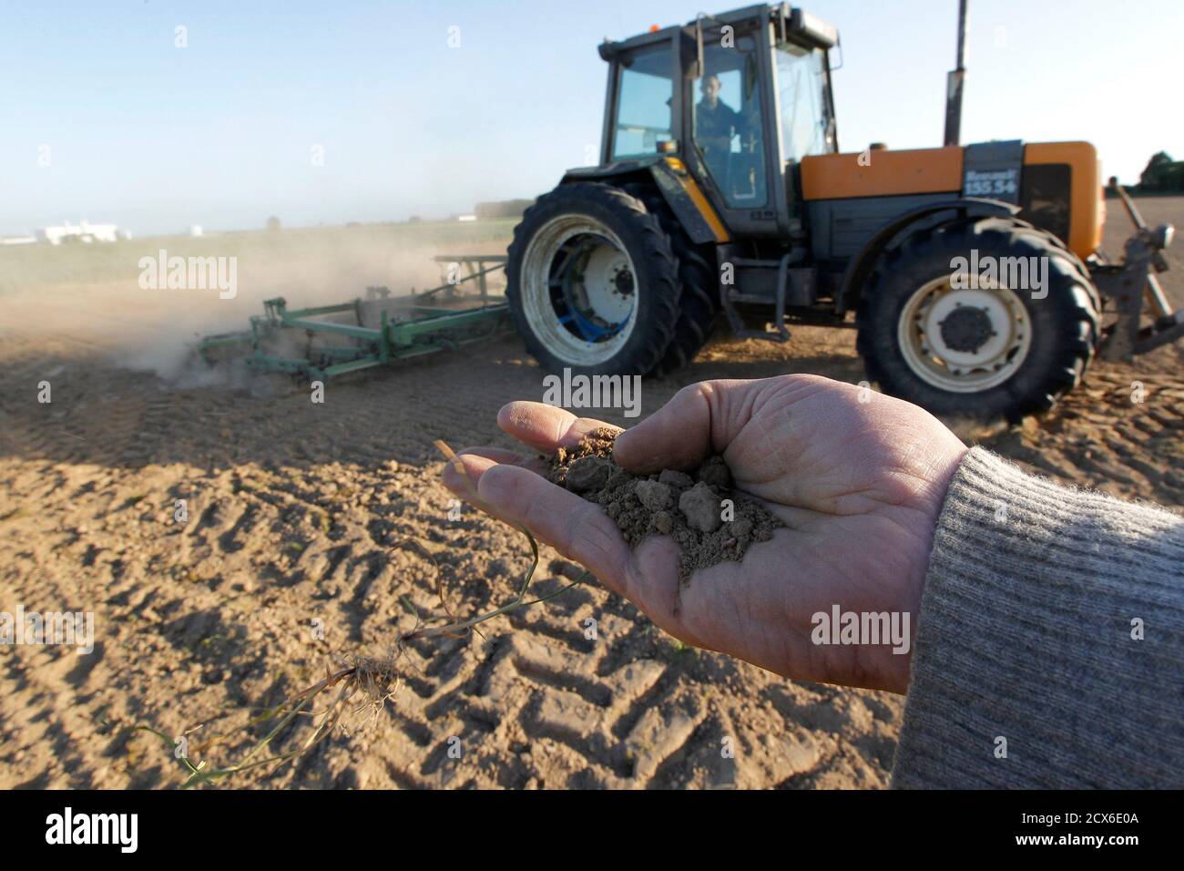 Farmer holds soil drought hi-res stock photography and images - Alamy