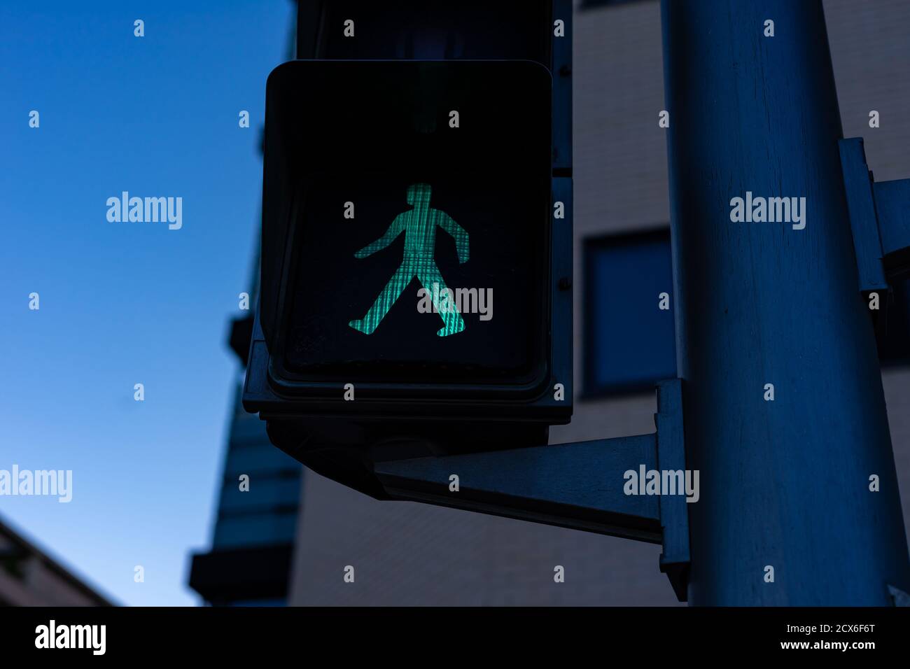 Low angle shot of green traffic light on the street at daytime Stock ...