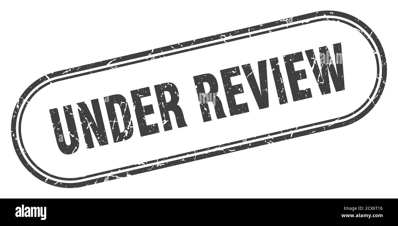 under review stamp. rounded grunge sign on white background Stock ...