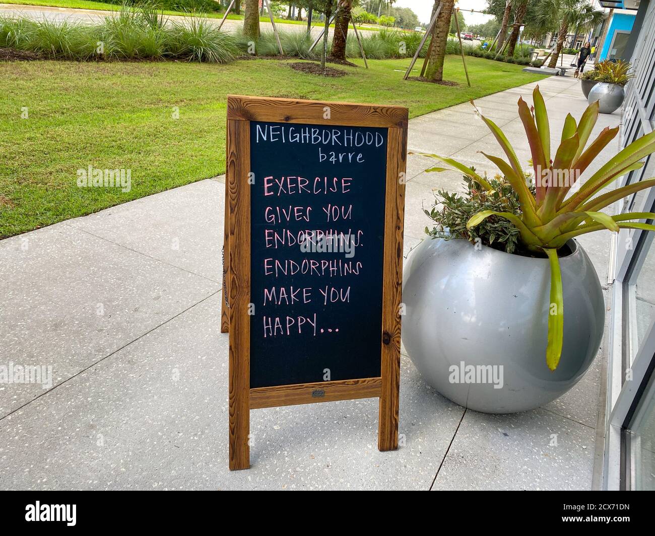 Orlando, FL/USA-9/29/20: A chalkboard sign on the sidewalk in front of ...