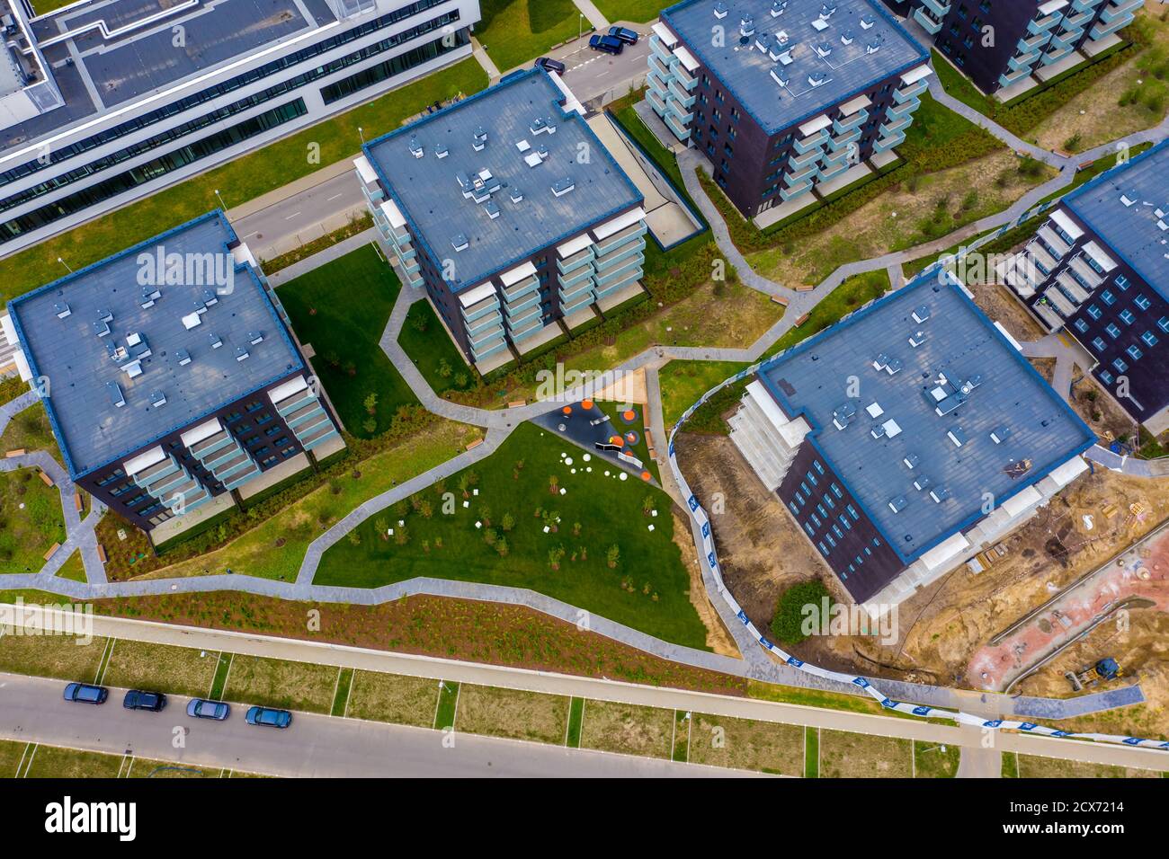 Aerial view of residential houses and driveways neighborhood. Tightly ...