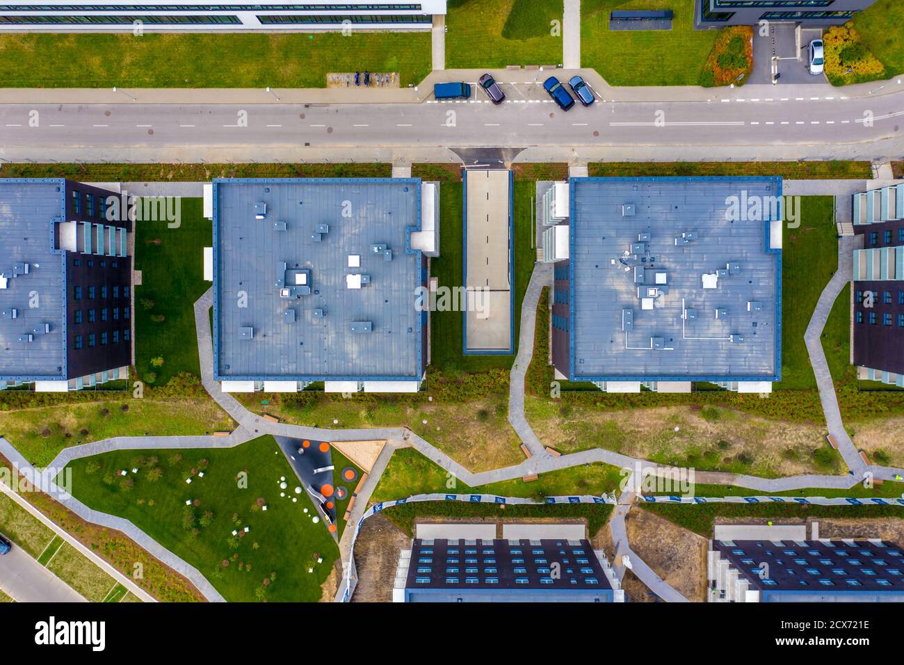 Aerial view of residential houses and driveways neighborhood. Tightly ...