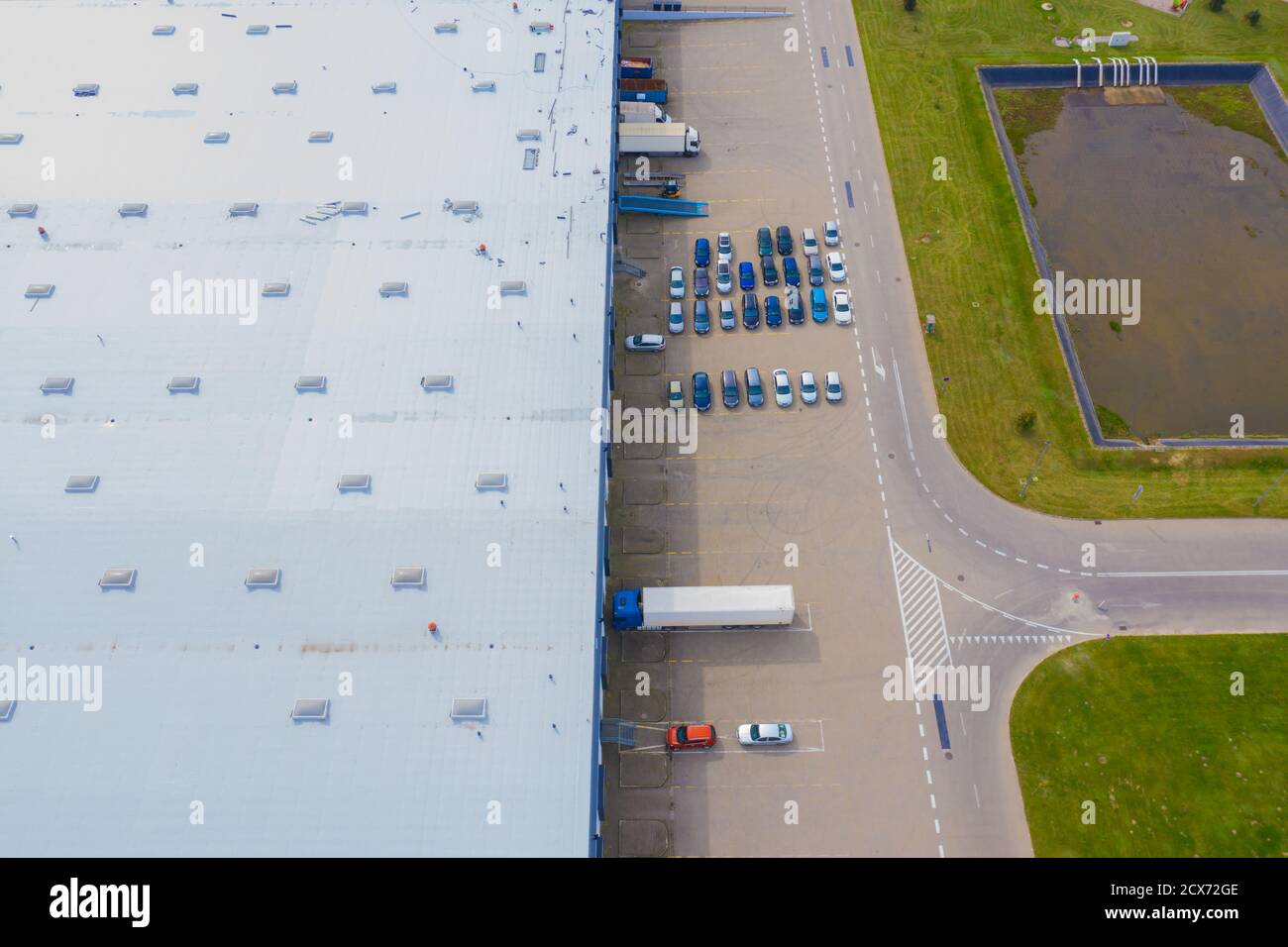 Aerial Top View of Industrial Storage Building Area with Solar Panels ...