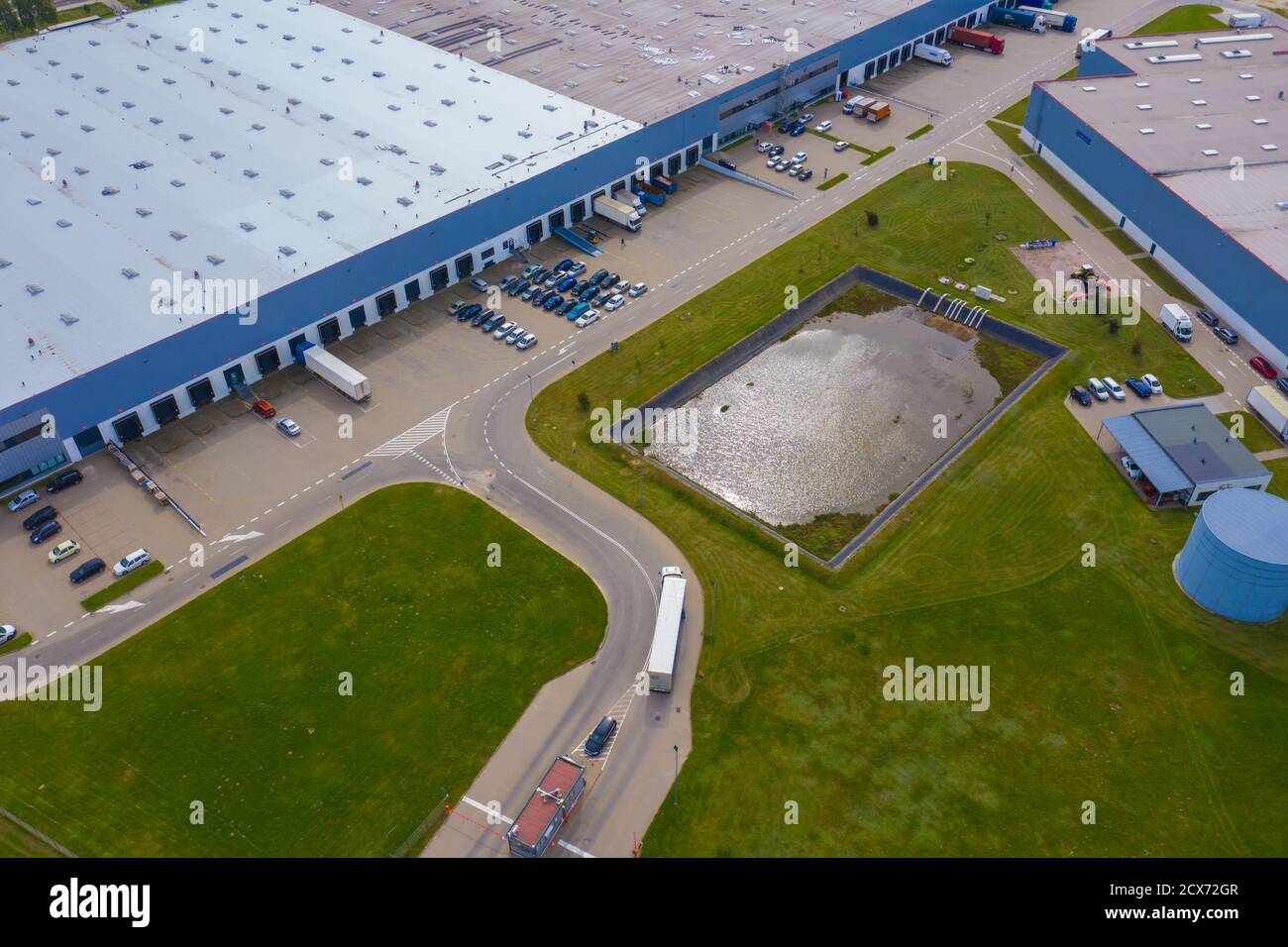 Aerial Top View of Industrial Storage Building Area with Solar Panels ...