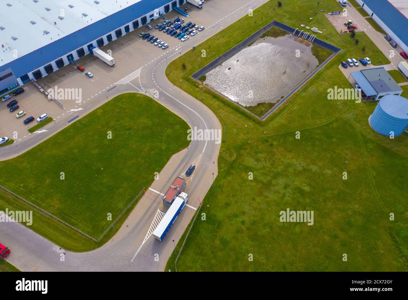 Aerial Top View of Industrial Storage Building Area with Solar Panels ...