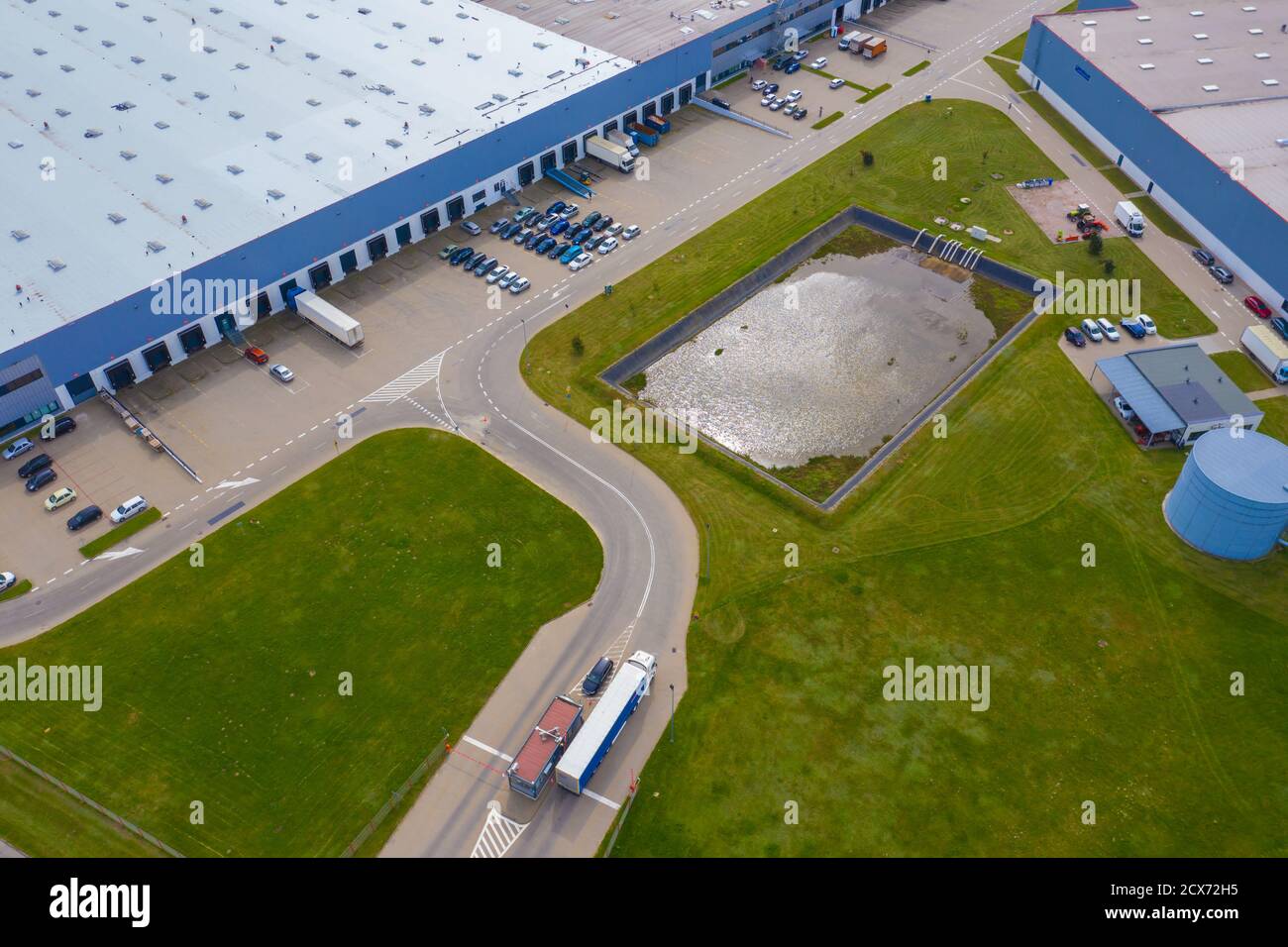 Aerial Top View of Industrial Storage Building Area with Solar Panels ...