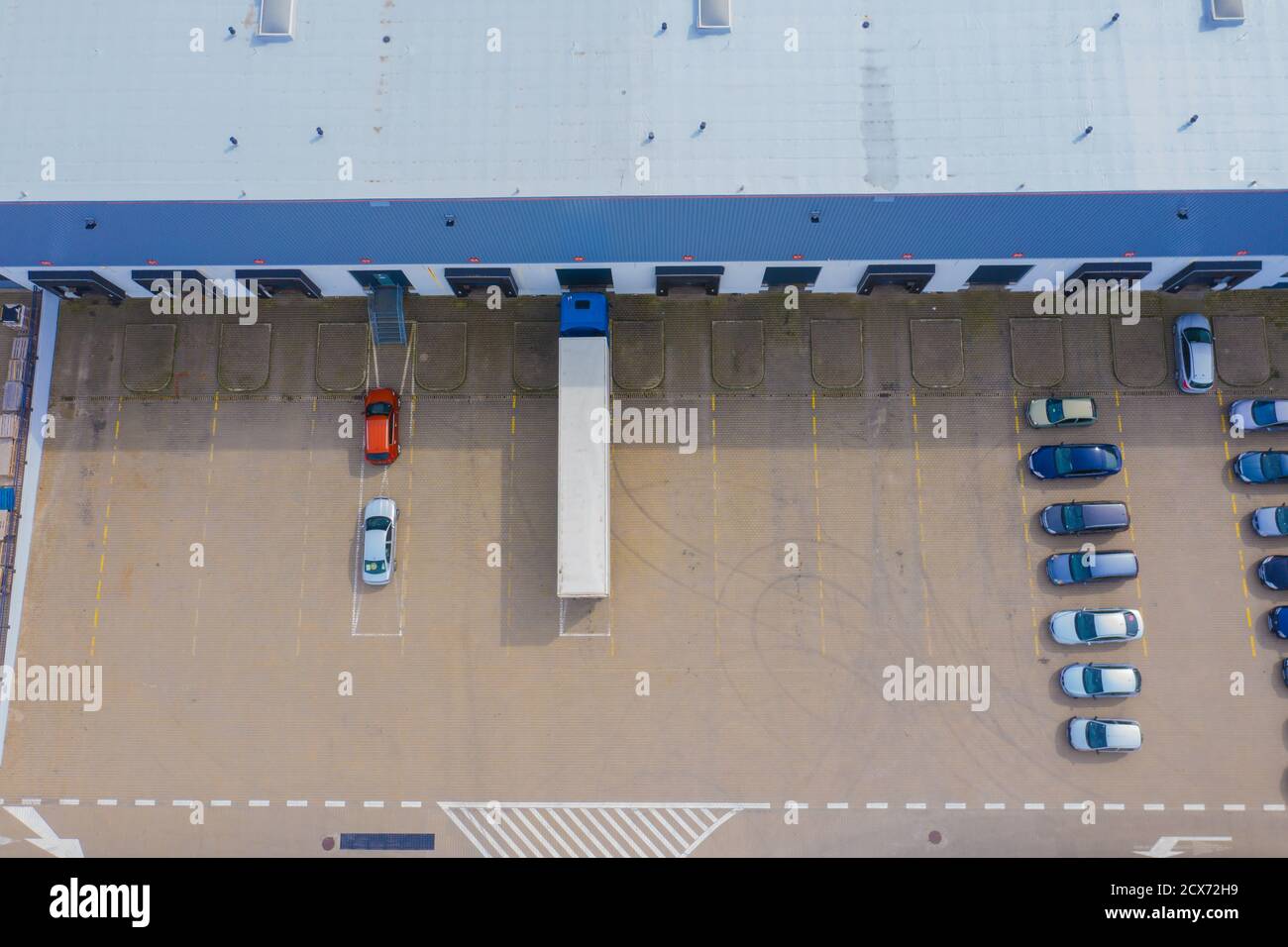Aerial Top View of Industrial Storage Building Area with Solar Panels ...