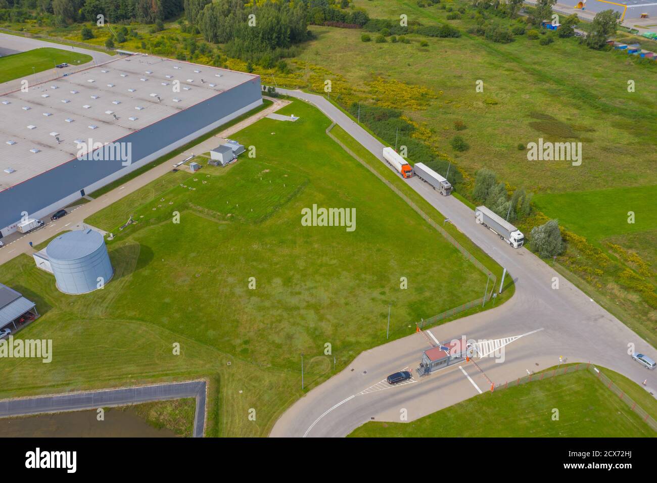 Aerial view of goods warehouse. Logistics center in industrial city ...
