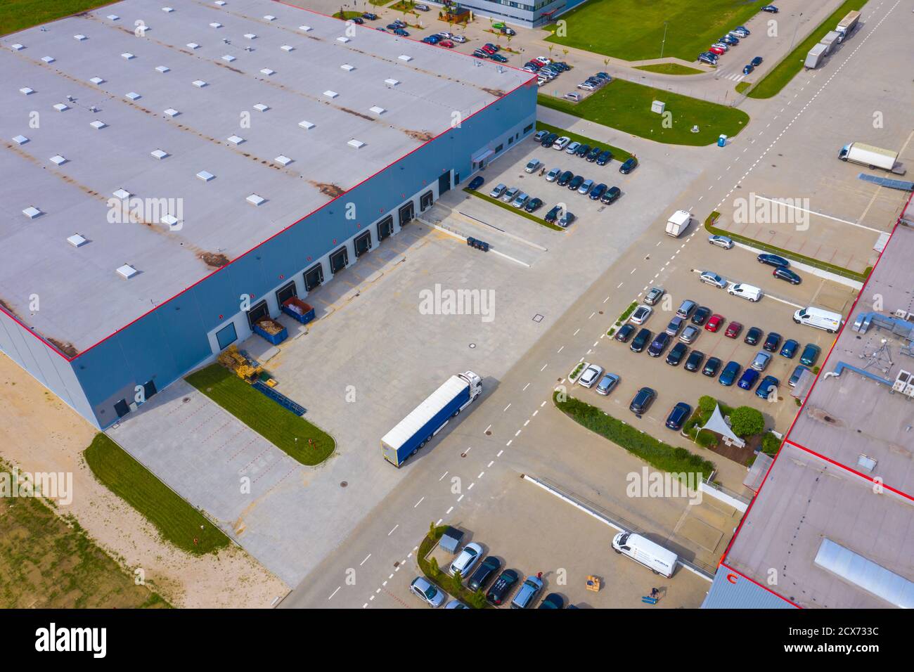 Aerial view of goods warehouse. Logistics center in industrial city ...