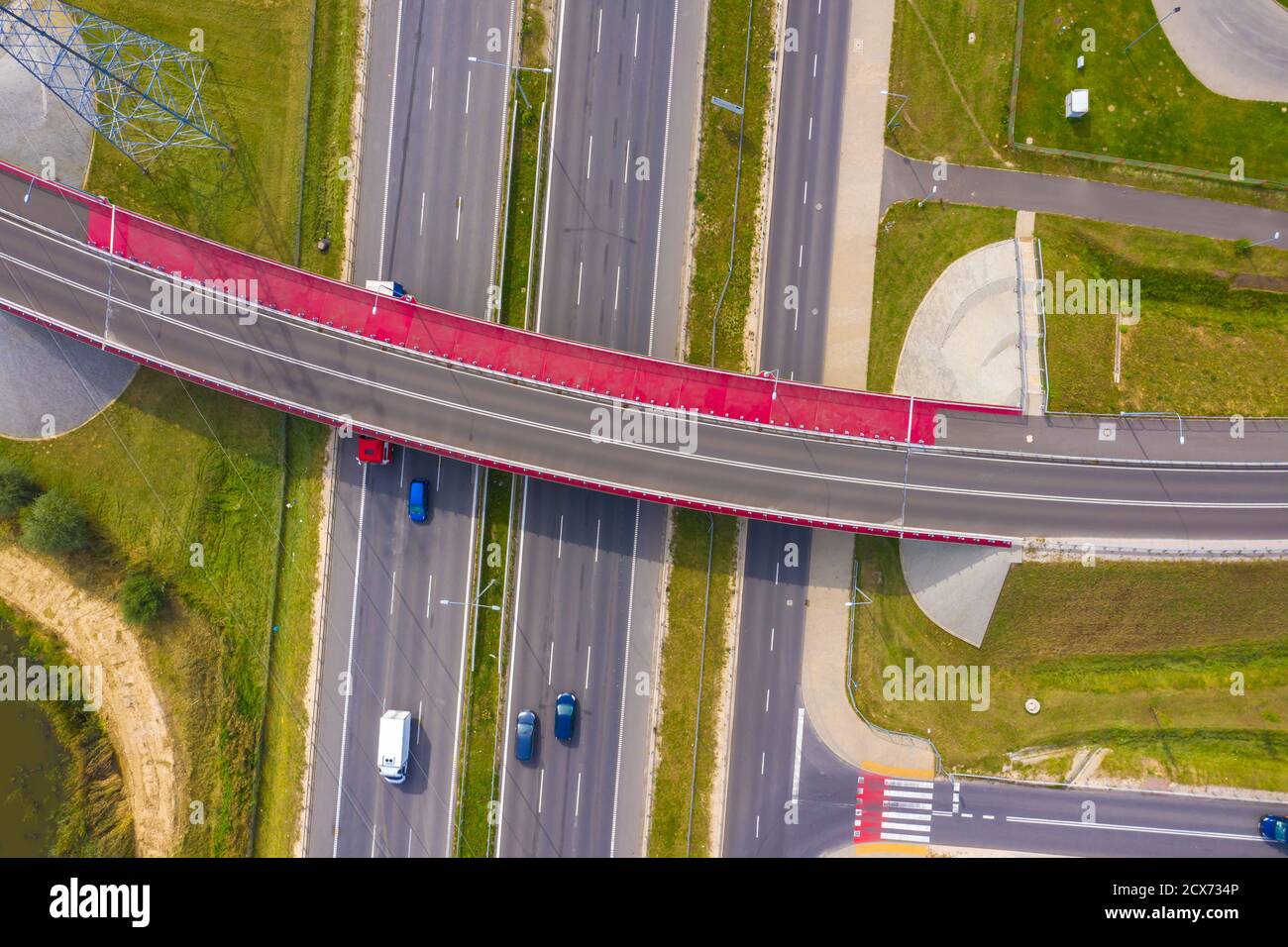 Aerial top view of bridge road automobile traffic of many cars ...