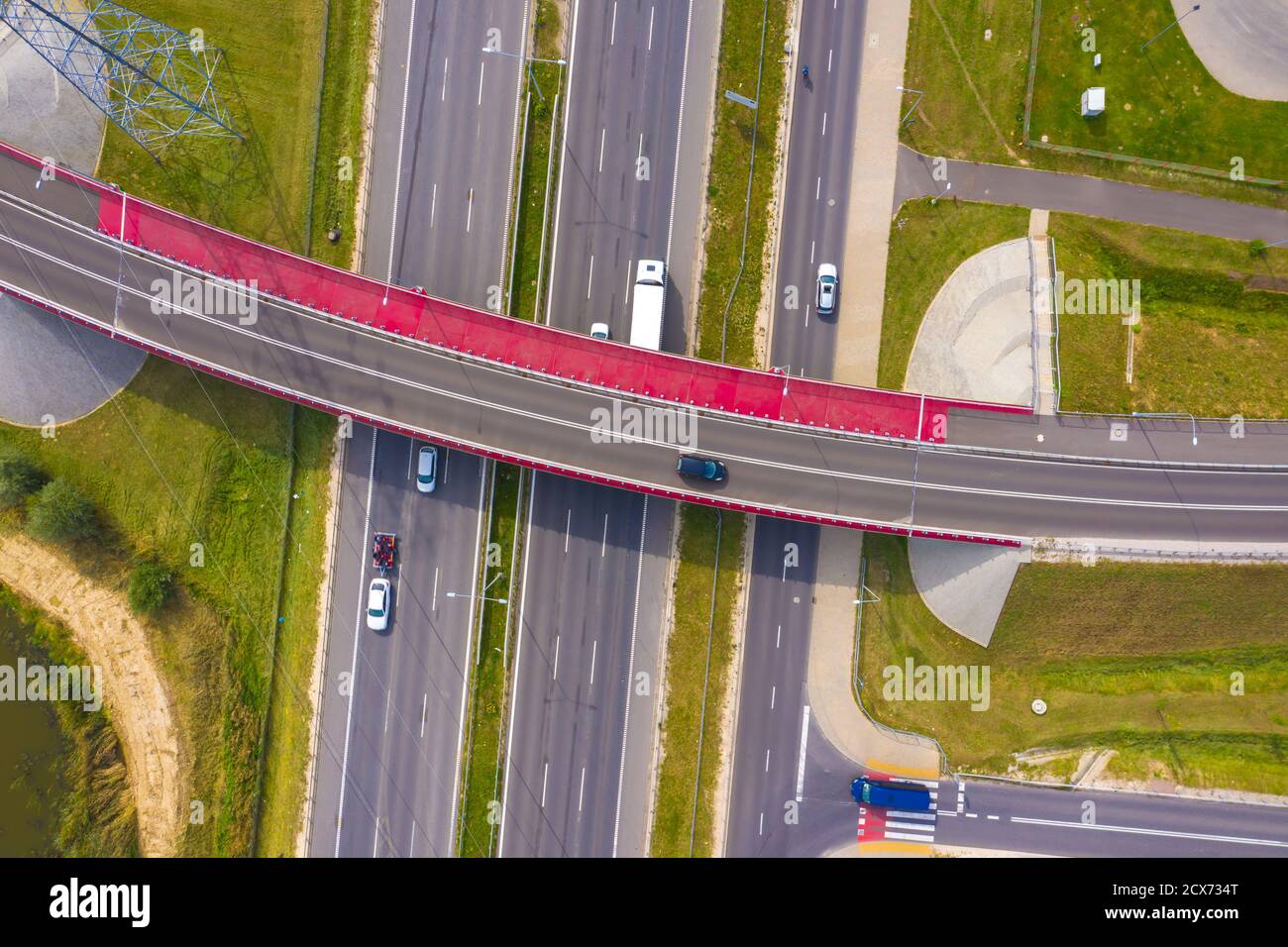 Aerial top view of bridge road automobile traffic of many cars ...