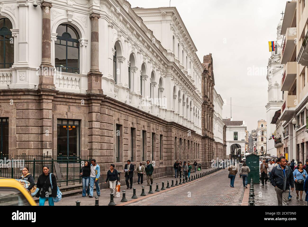 Quito, Ecuador - December 2, 2008: Historic downtown. Street scene with ...