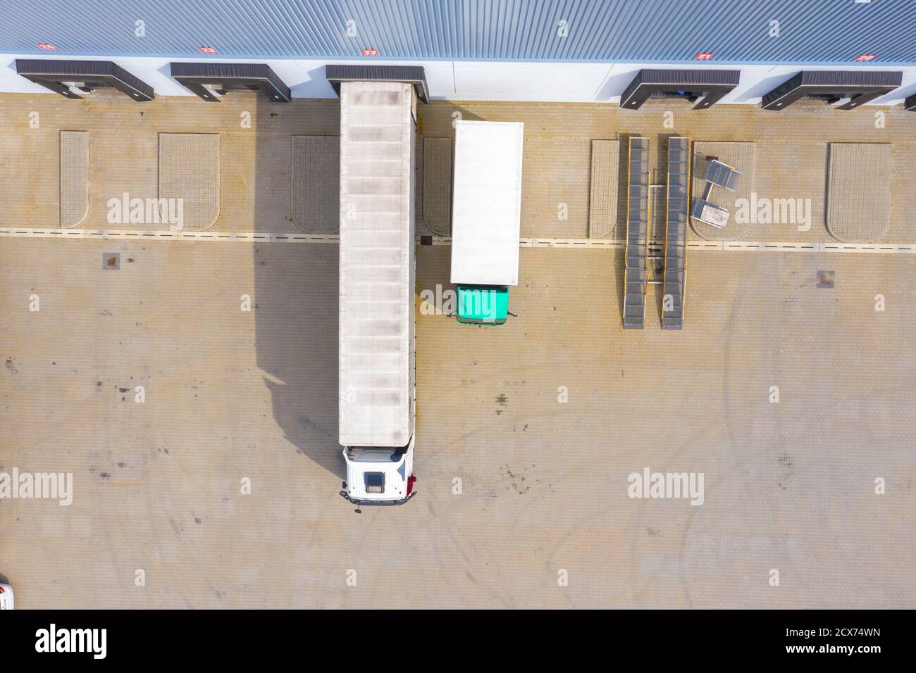 Aerial view of goods warehouse. Logistics center in industrial city ...