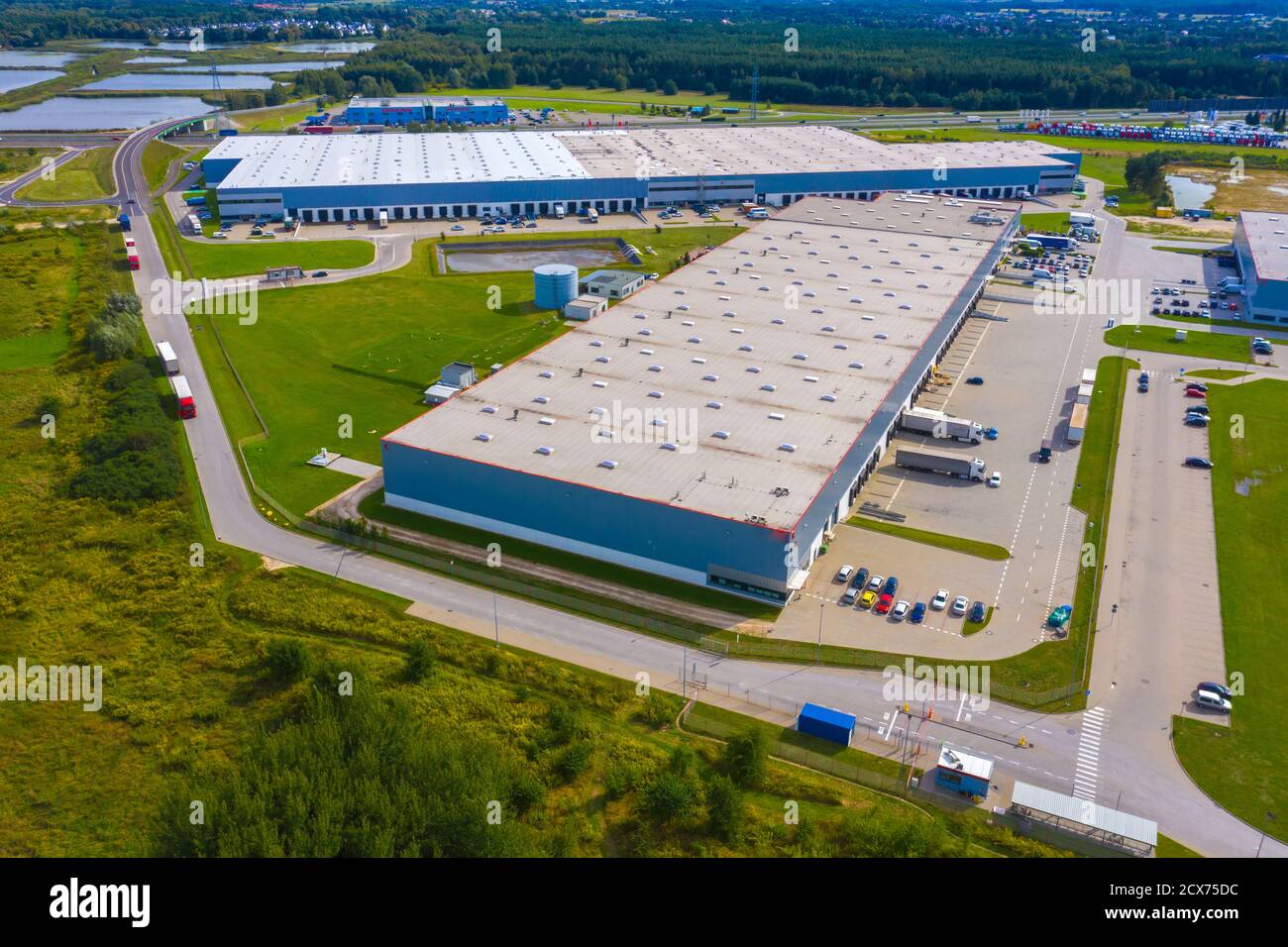 Aerial view of goods warehouse. Logistics center in industrial city ...