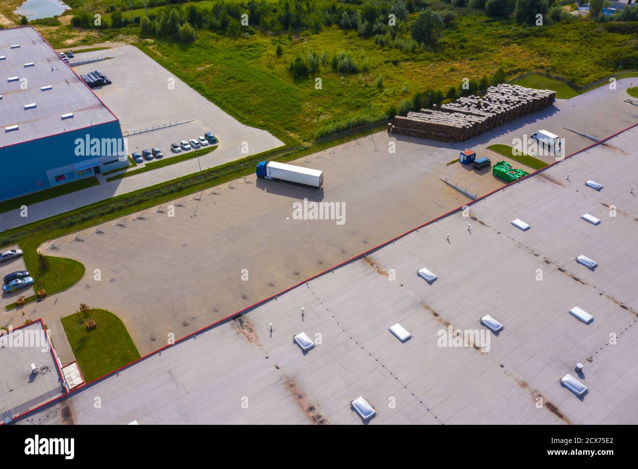 Aerial view of goods warehouse. Logistics center in industrial city ...
