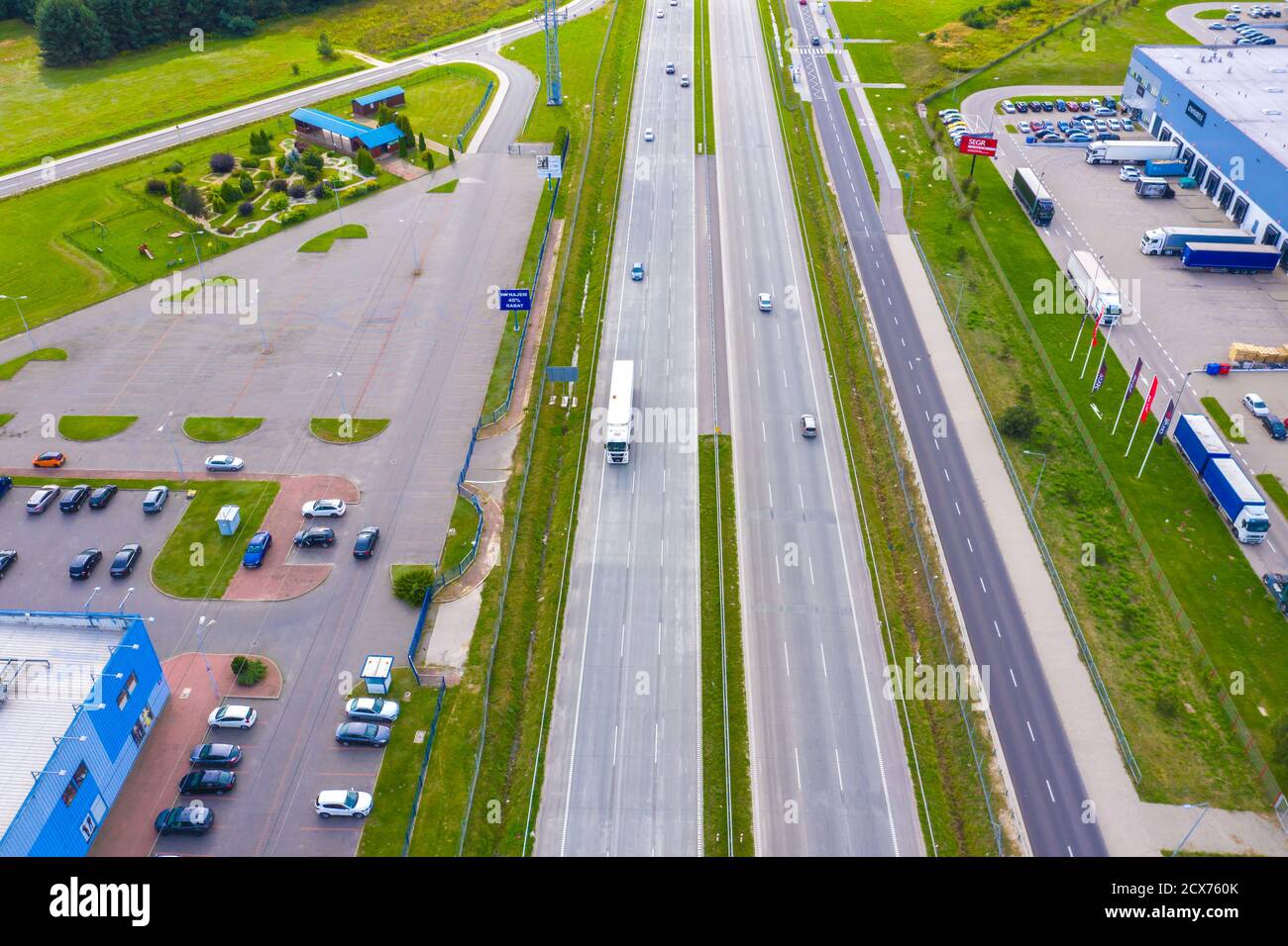 Aerial top view of highway automobile traffic of many cars ...