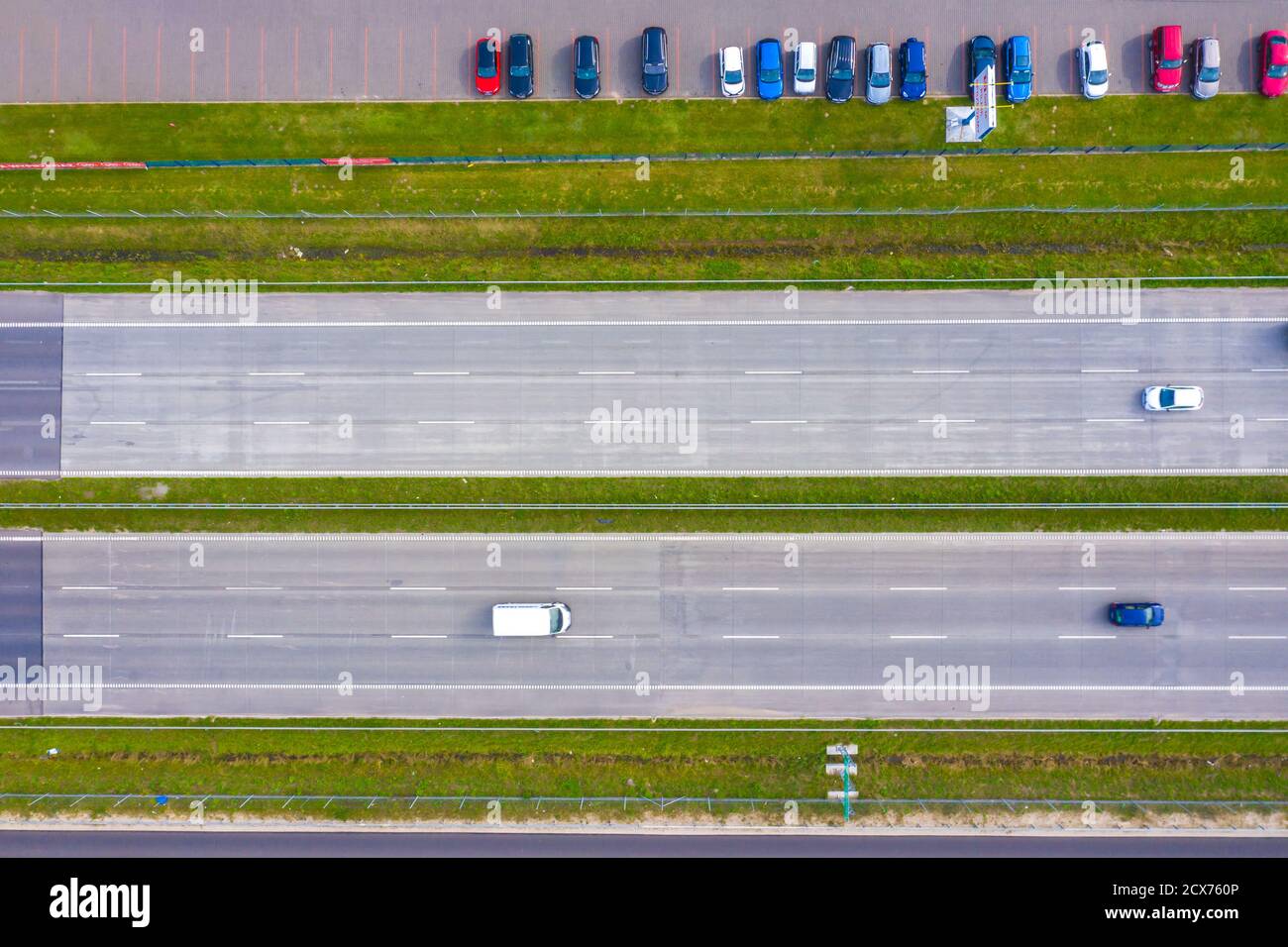 Aerial top view of highway automobile traffic of many cars ...