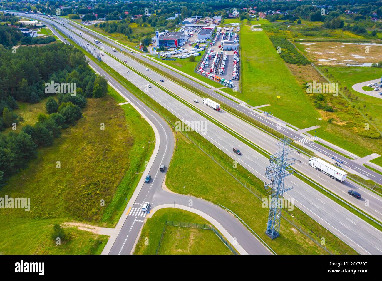 Aerial top view of highway automobile traffic of many cars ...