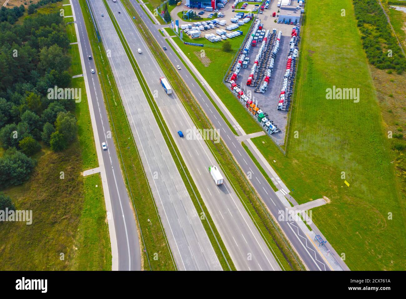 Aerial top view of highway automobile traffic of many cars ...