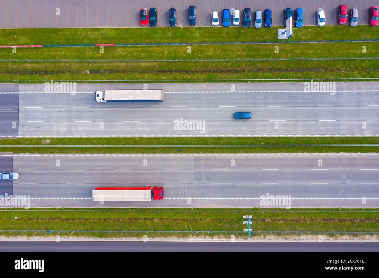Aerial top view of highway automobile traffic of many cars ...