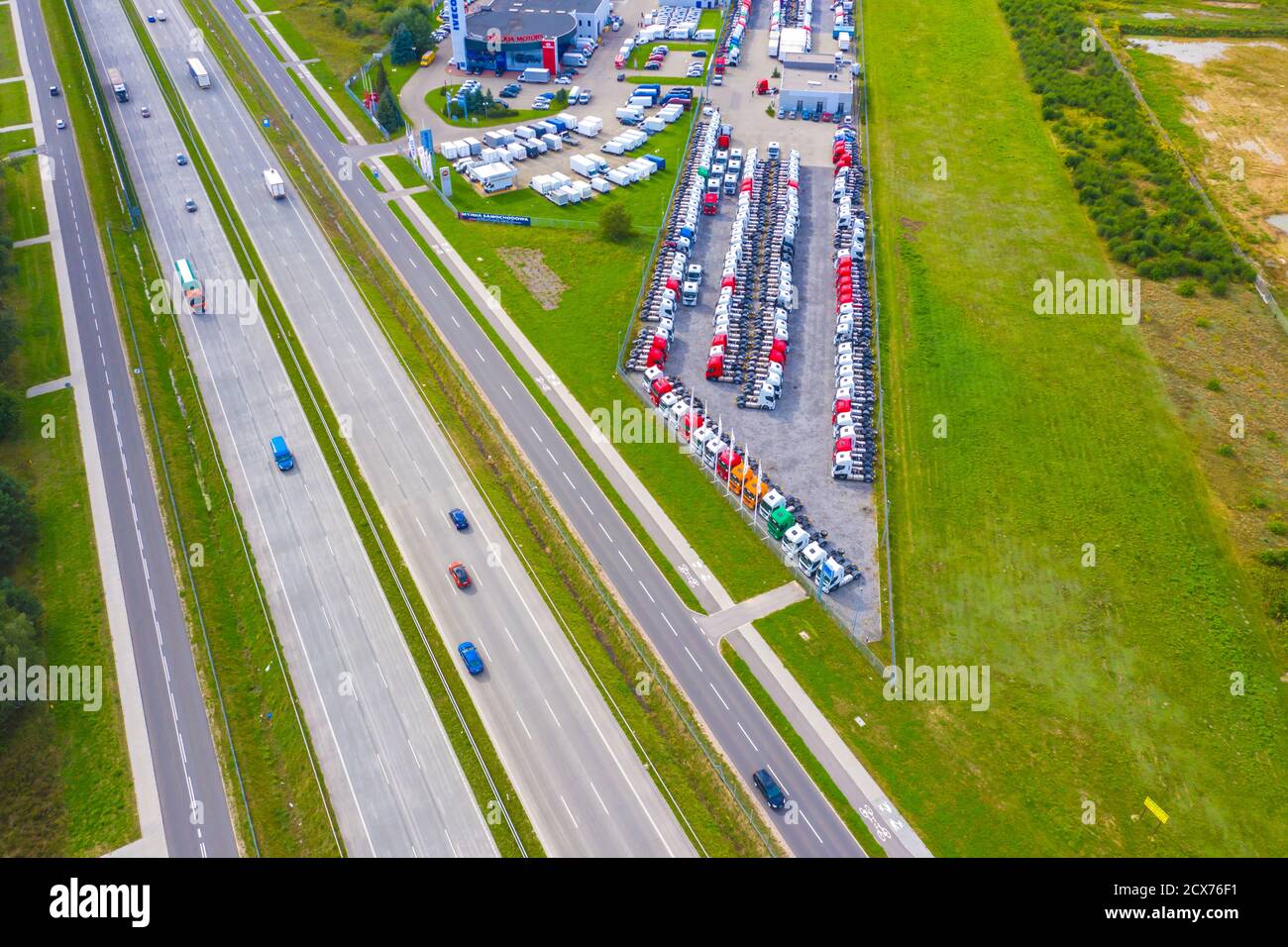 Aerial top view of highway automobile traffic of many cars ...