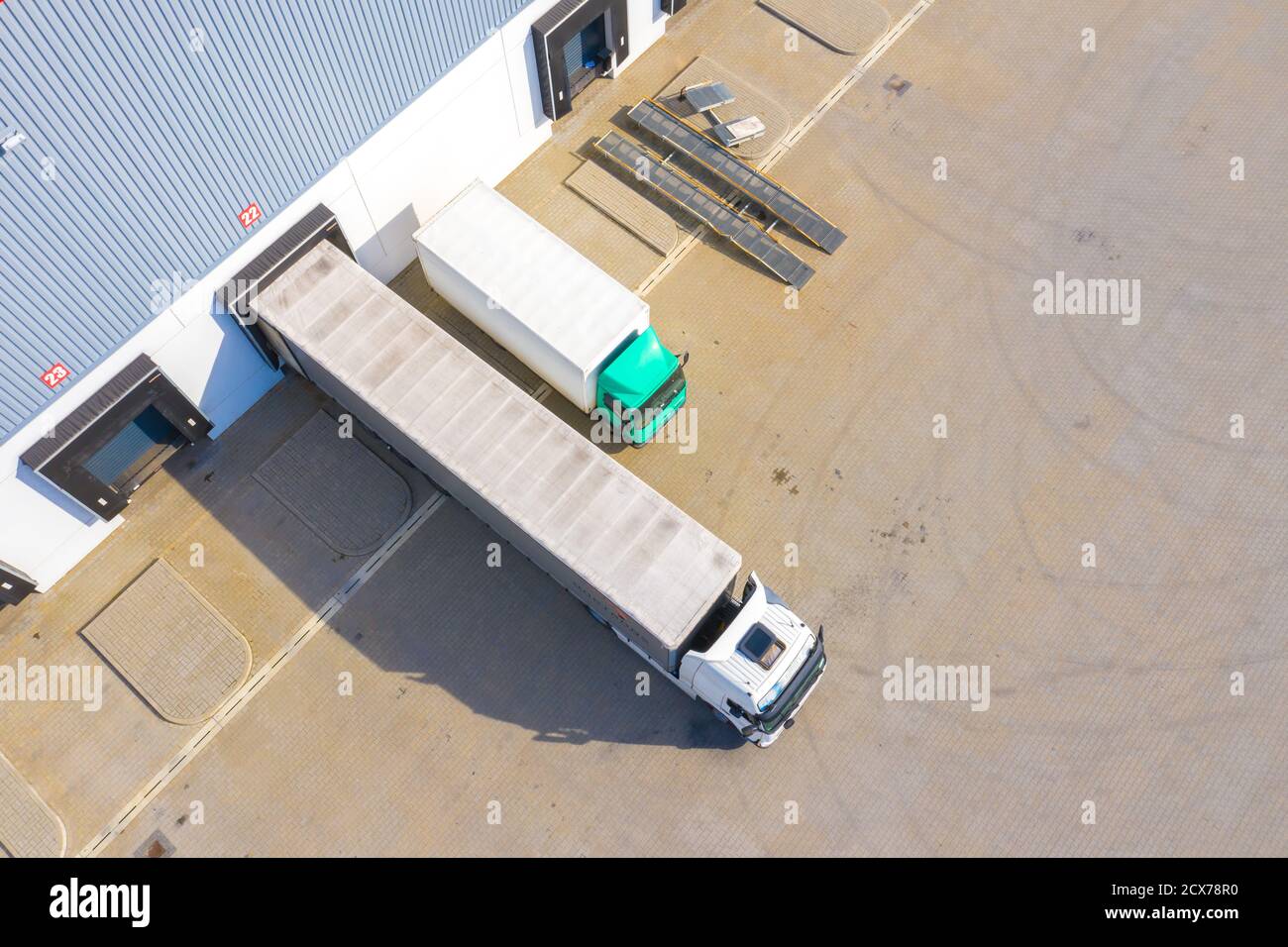 Aerial view of goods warehouse. Logistics center in industrial city ...