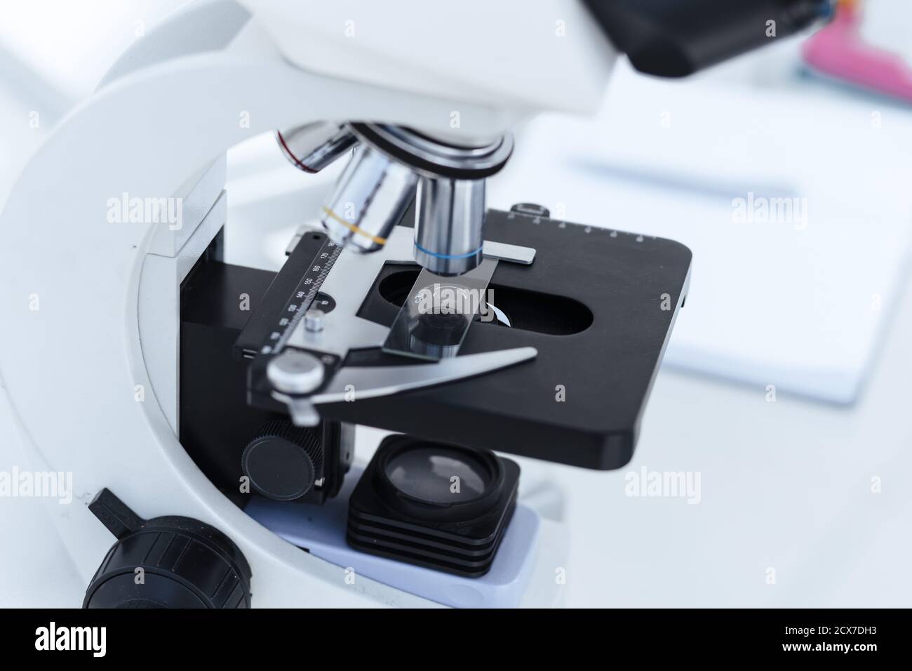 image of a microscope with a sample on a table in the laboratory Stock ...