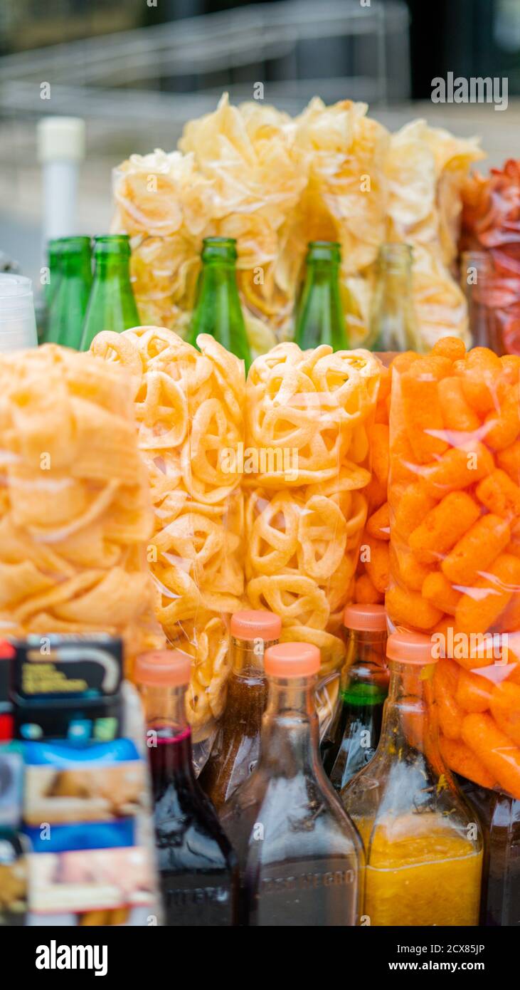 Mexican Fried Snacks, Syrup and Cigarettes for Sale Stock Photo - Alamy