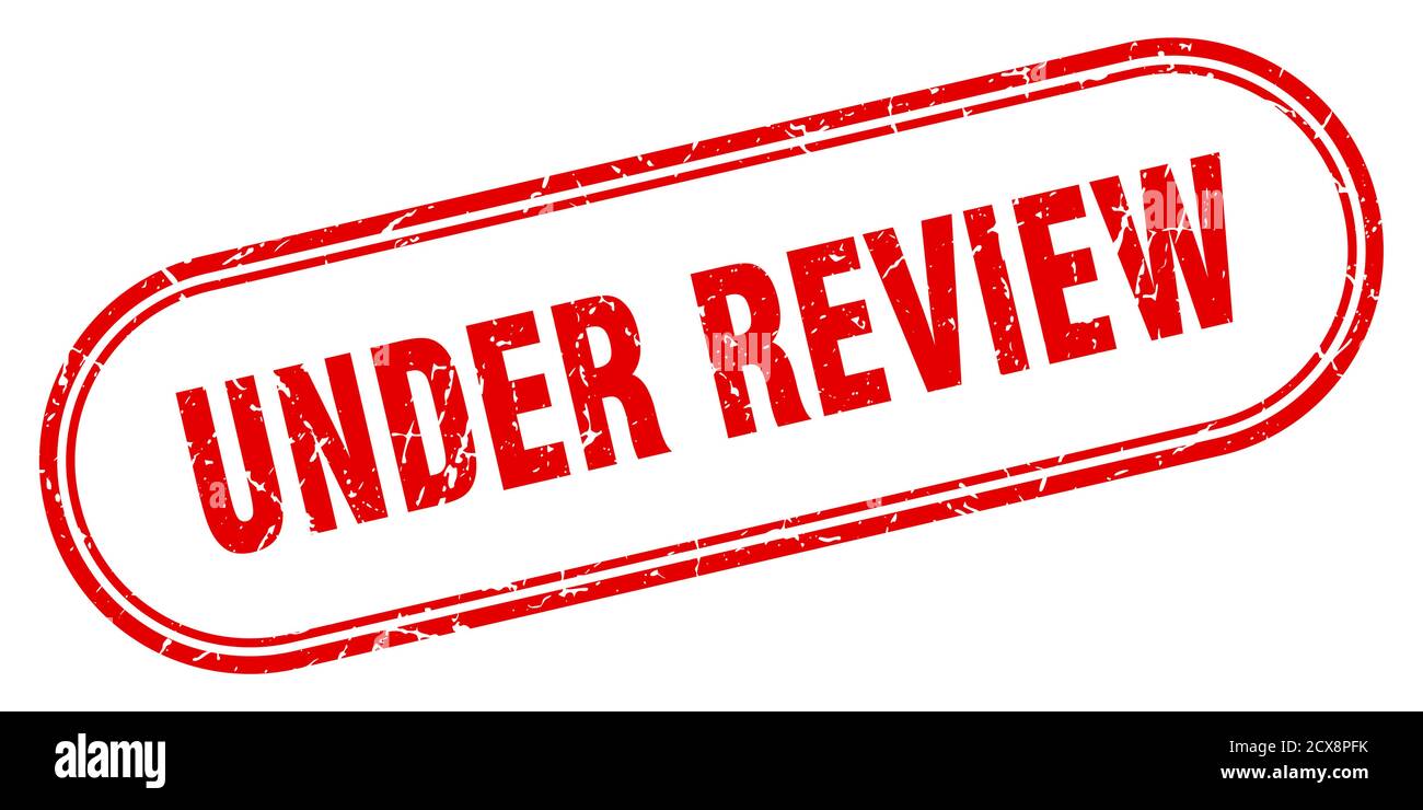 under review stamp. rounded grunge sign on white background Stock ...