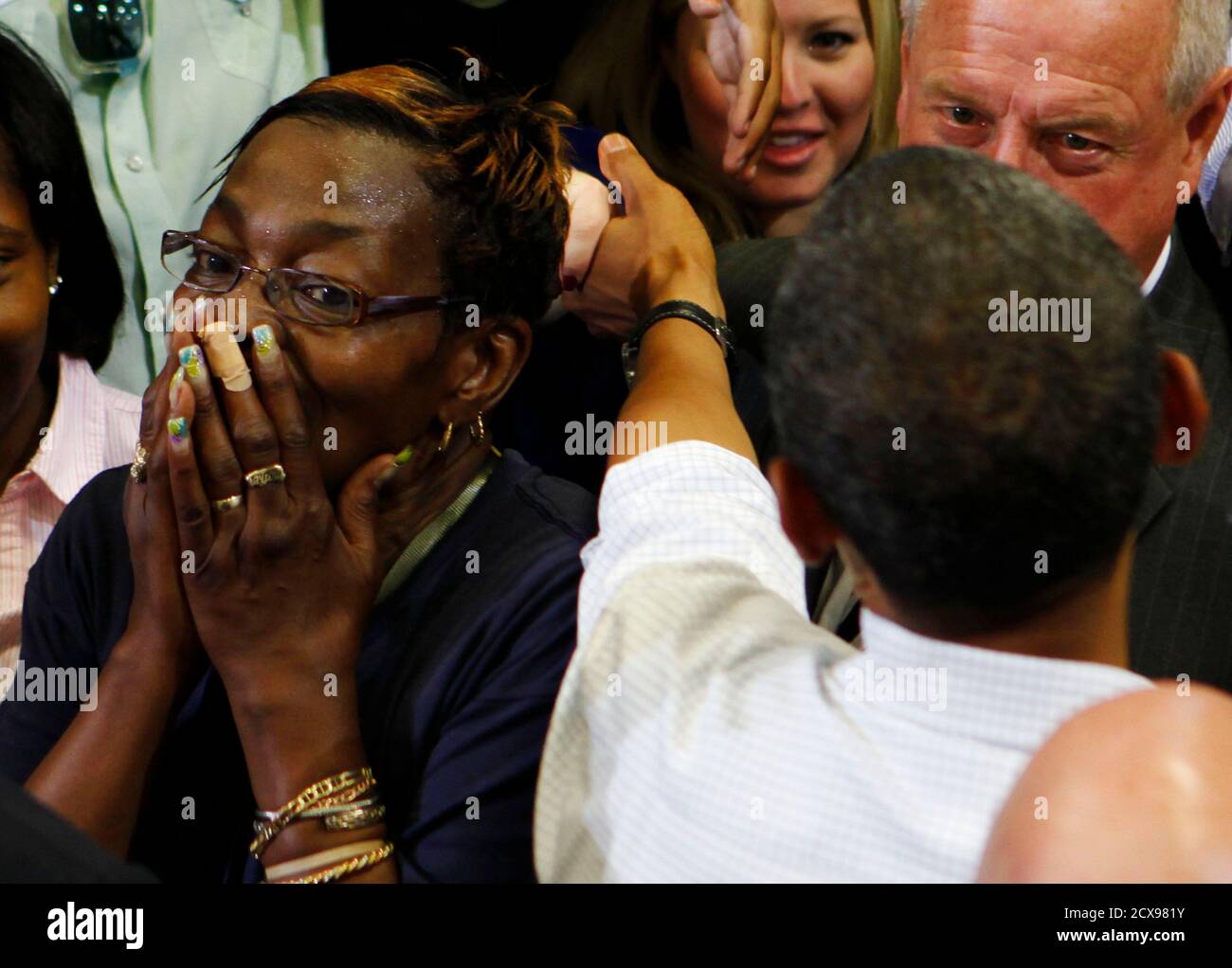 Woman shaking hand government hi-res stock photography and images - Alamy