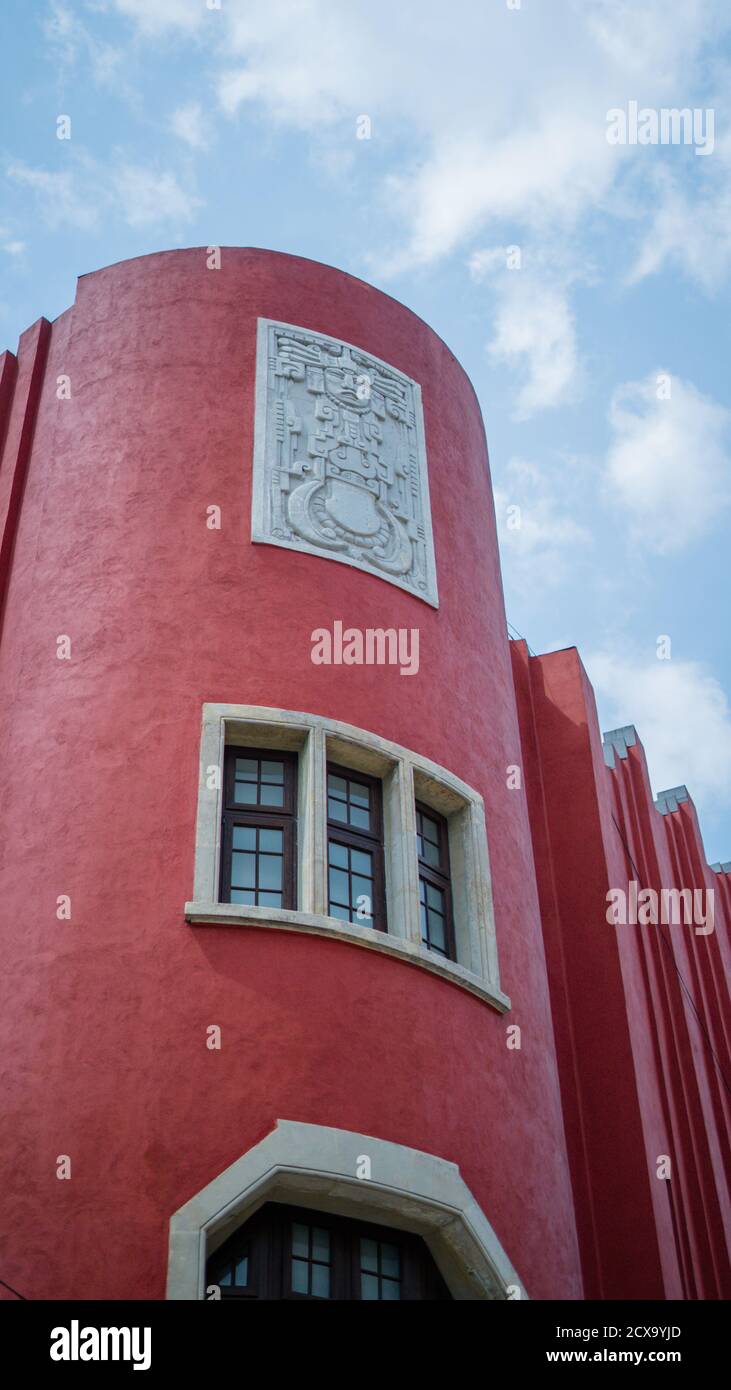 Stone Ancient Aztec Art on the Curved Wall of a Red Building Stock ...