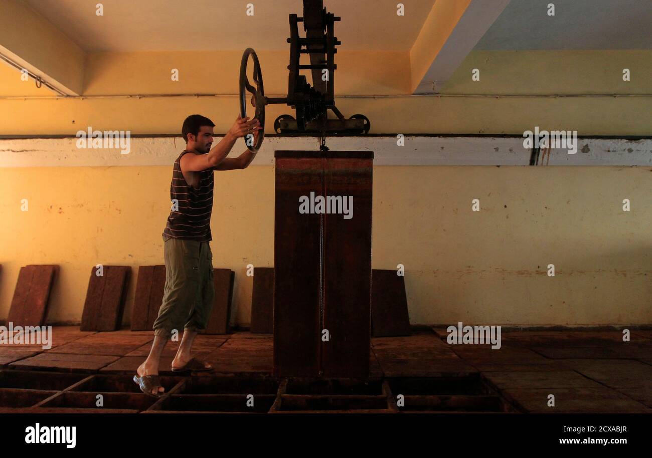 Ice blocks lift hi-res stock photography and images - Alamy