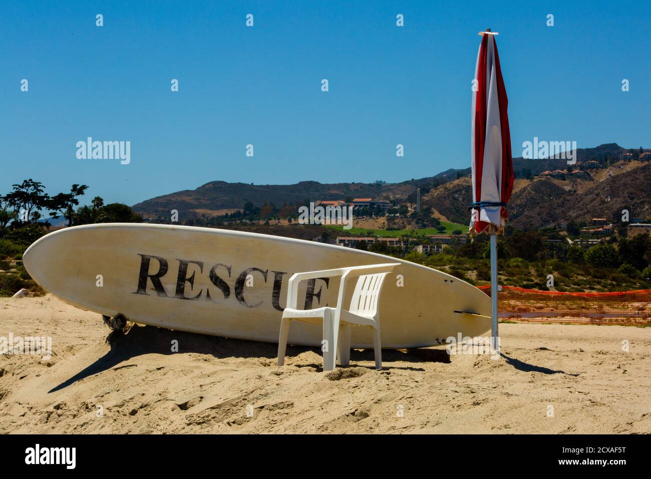 A rescue board waiting for any emergency on the beach Stock Photo - Alamy