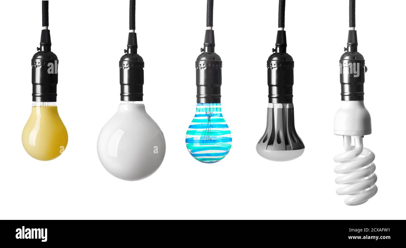 Different light bulbs on white background Stock Photo - Alamy