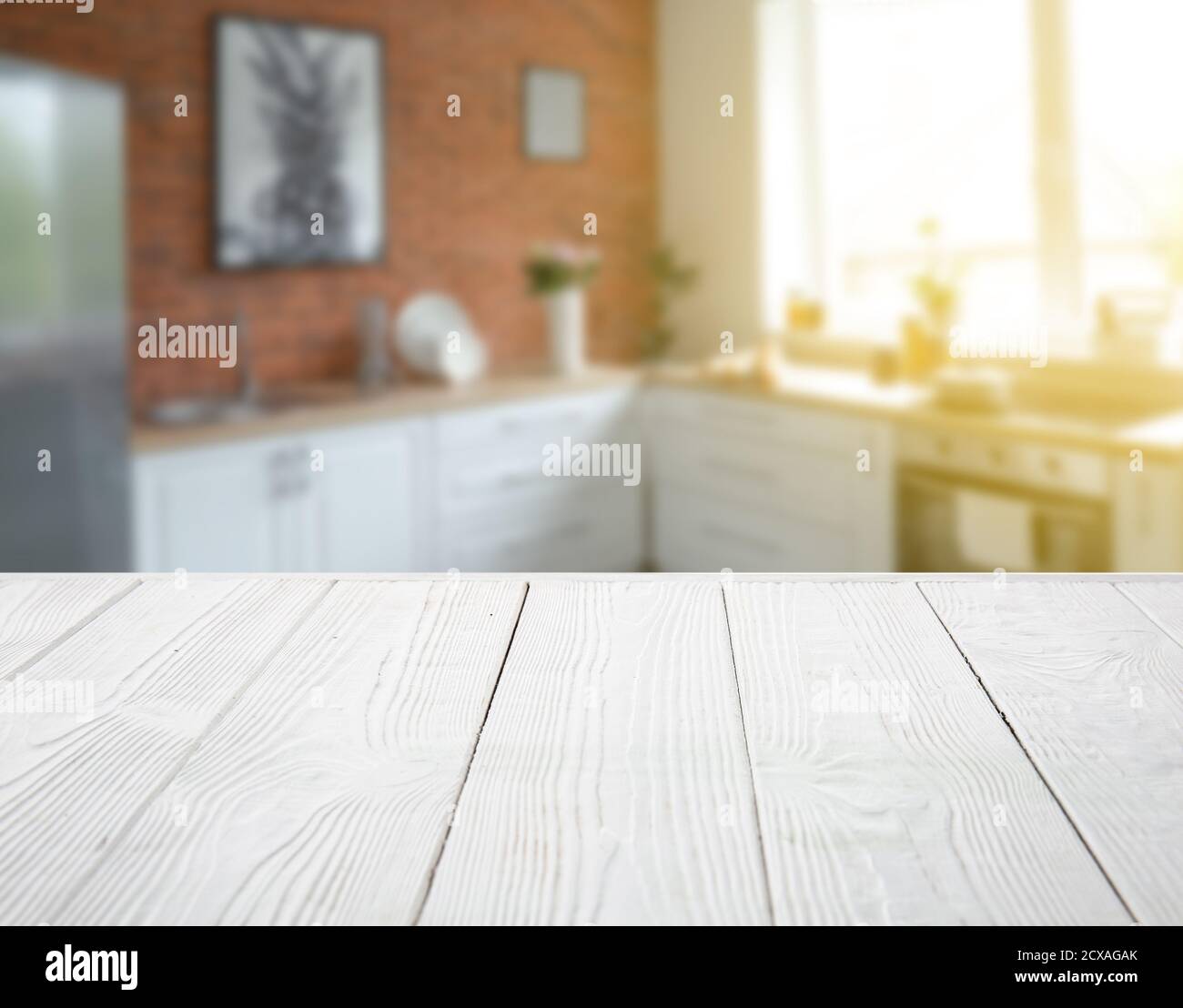 Empty wooden table in modern kitchen Stock Photo - Alamy