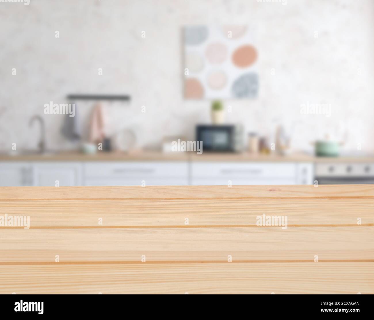 Empty wooden table in modern kitchen Stock Photo - Alamy