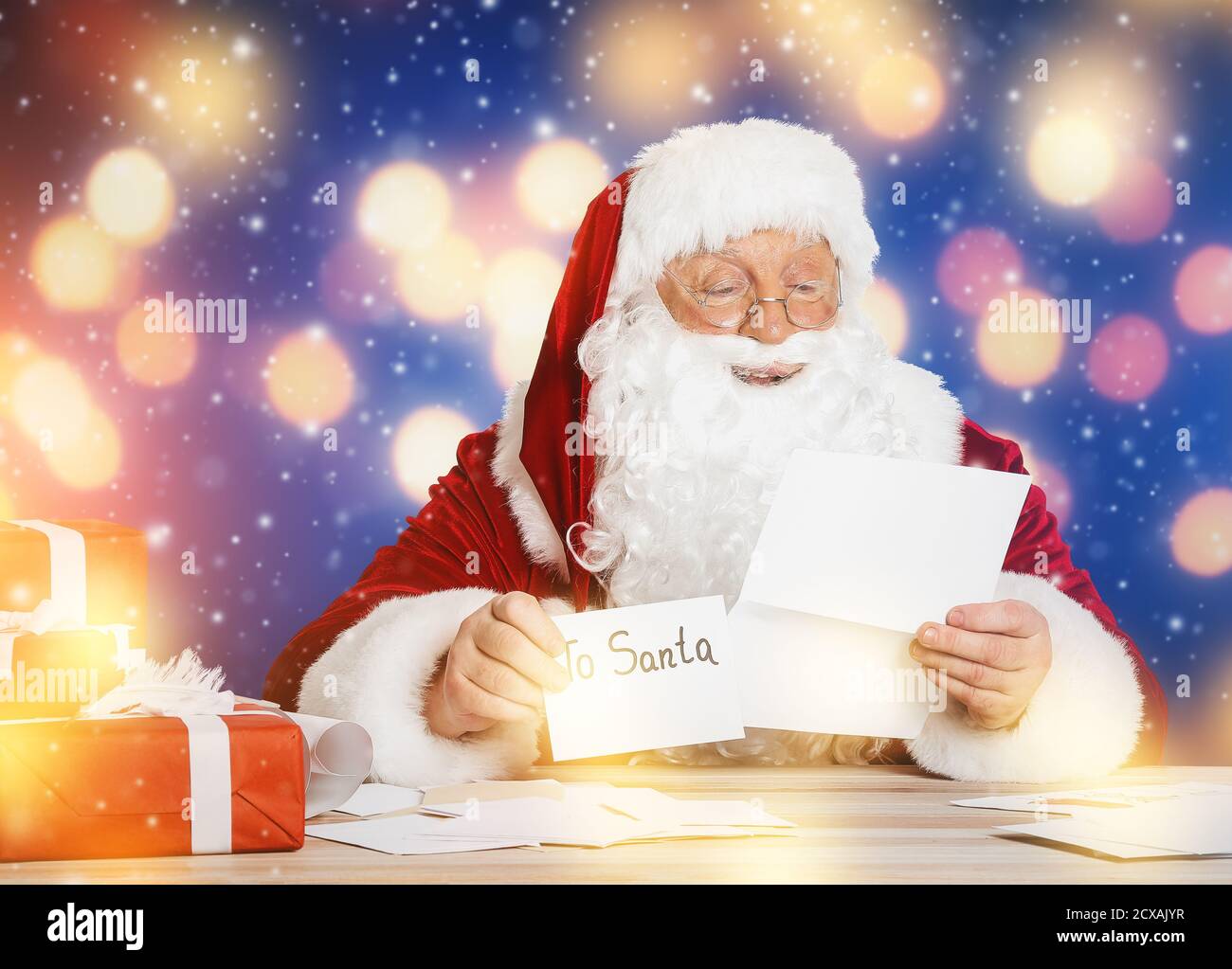 Santa Reading Letters High Resolution Stock Photography and Images - Alamy
